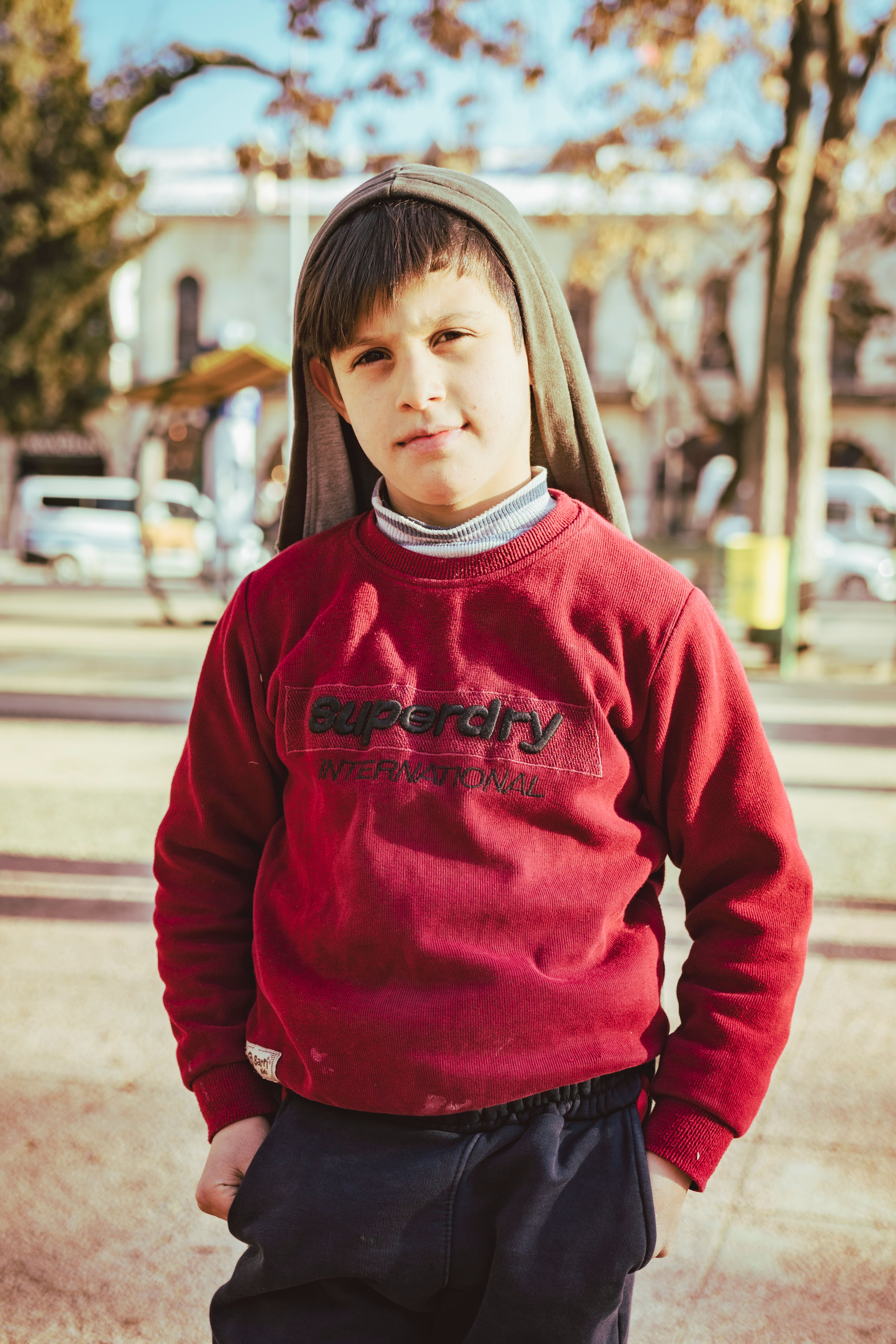 A Boy Doing a Peace Sign · Free Stock Photo