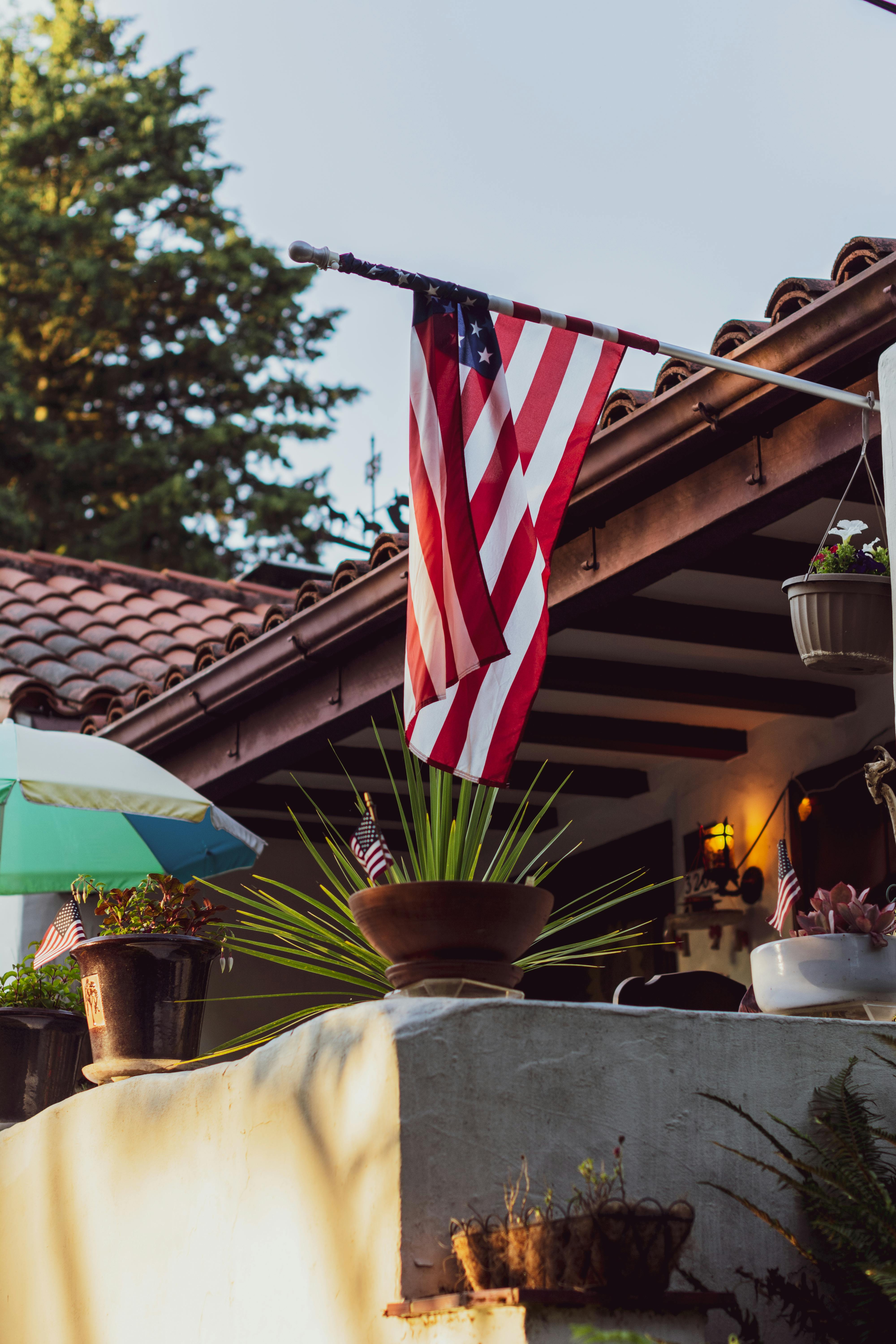 Rainbow Colored Flag Calling for Peace Hung on the Railing of the ...