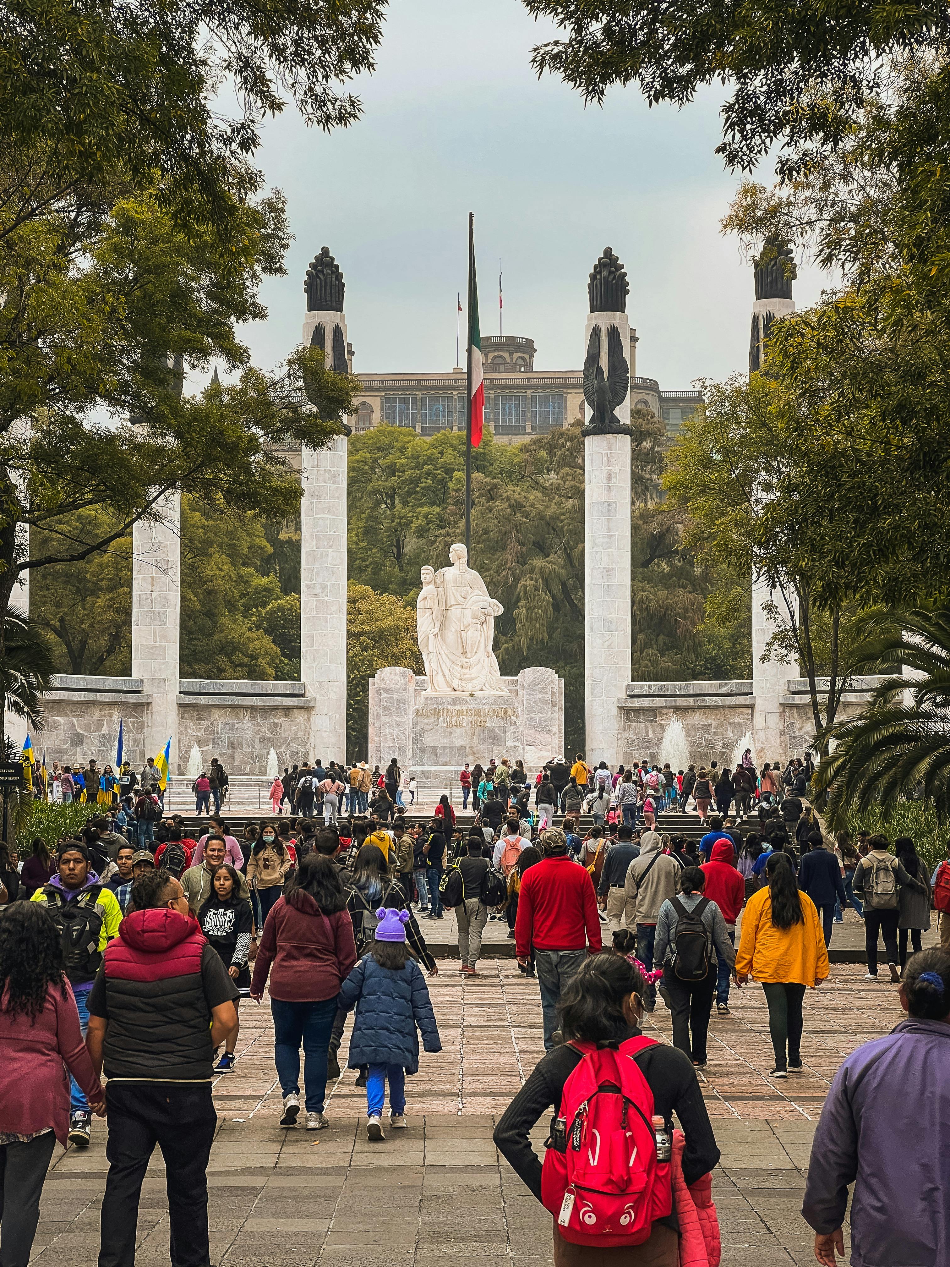 People Walking Next to the Monument of the Niños Heroes at the ...