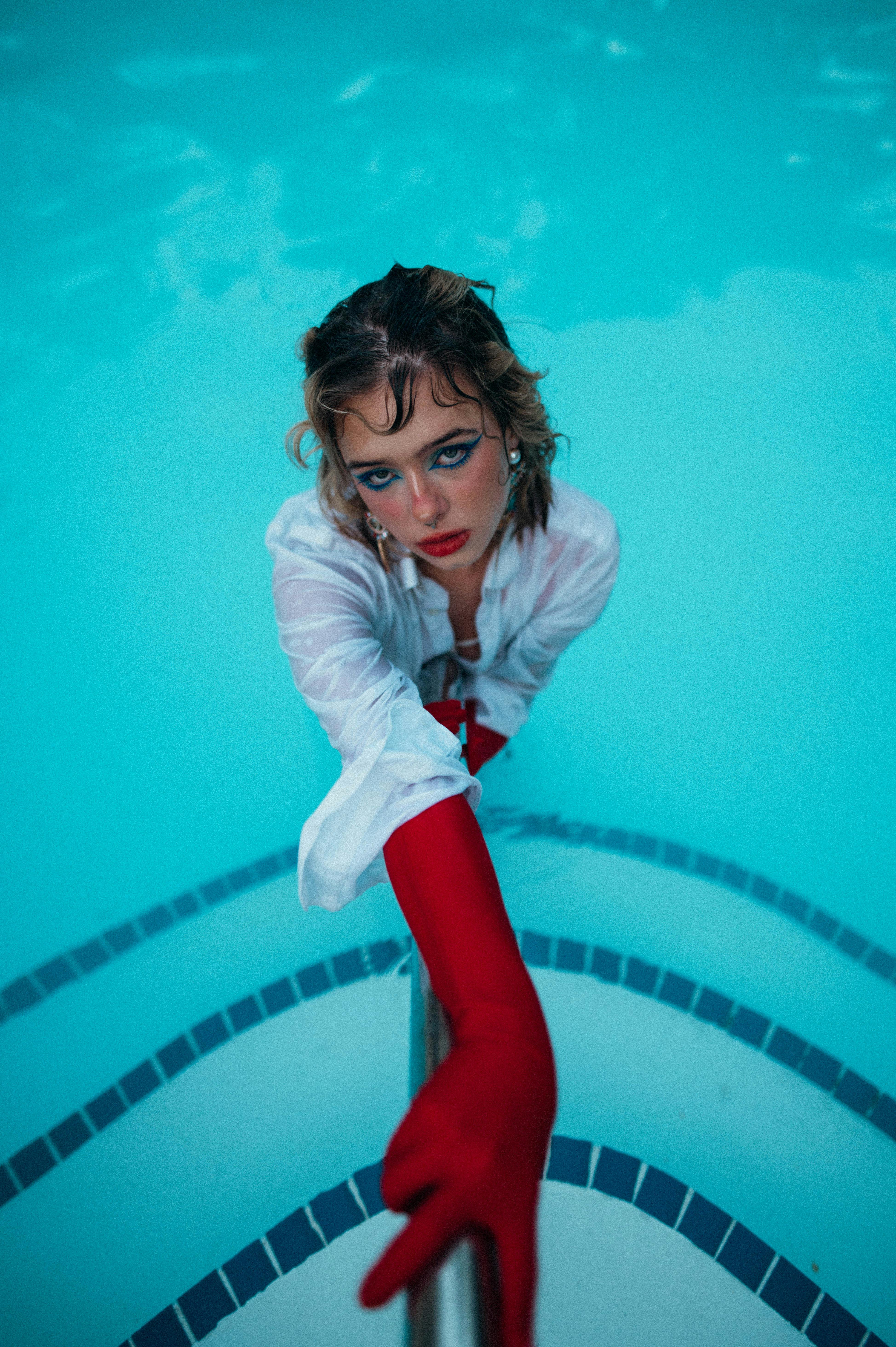 Beautiful Woman Wearing Shirt and Makeup in Swimming Pool · Free Stock ...