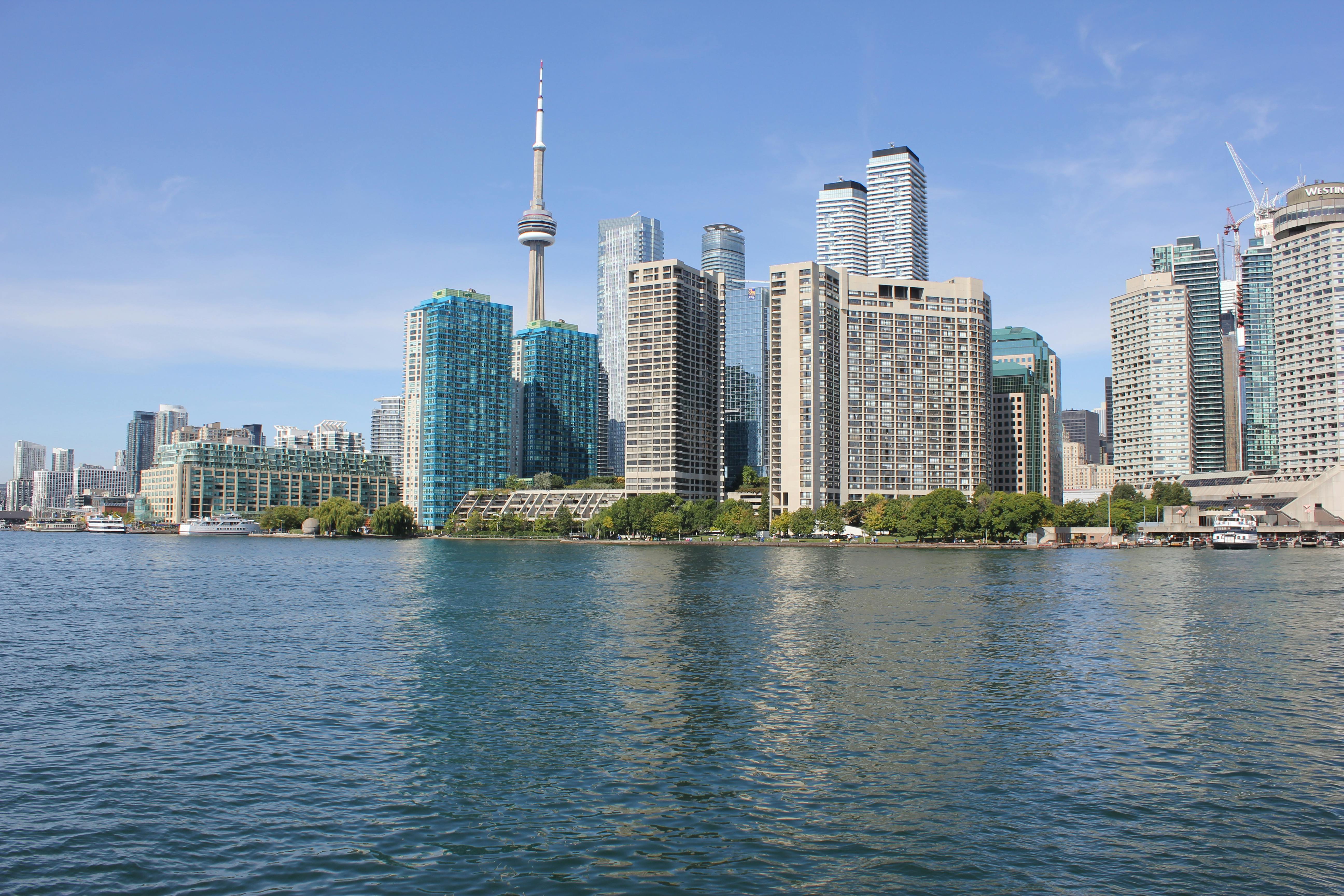 City Buildings near River · Free Stock Photo