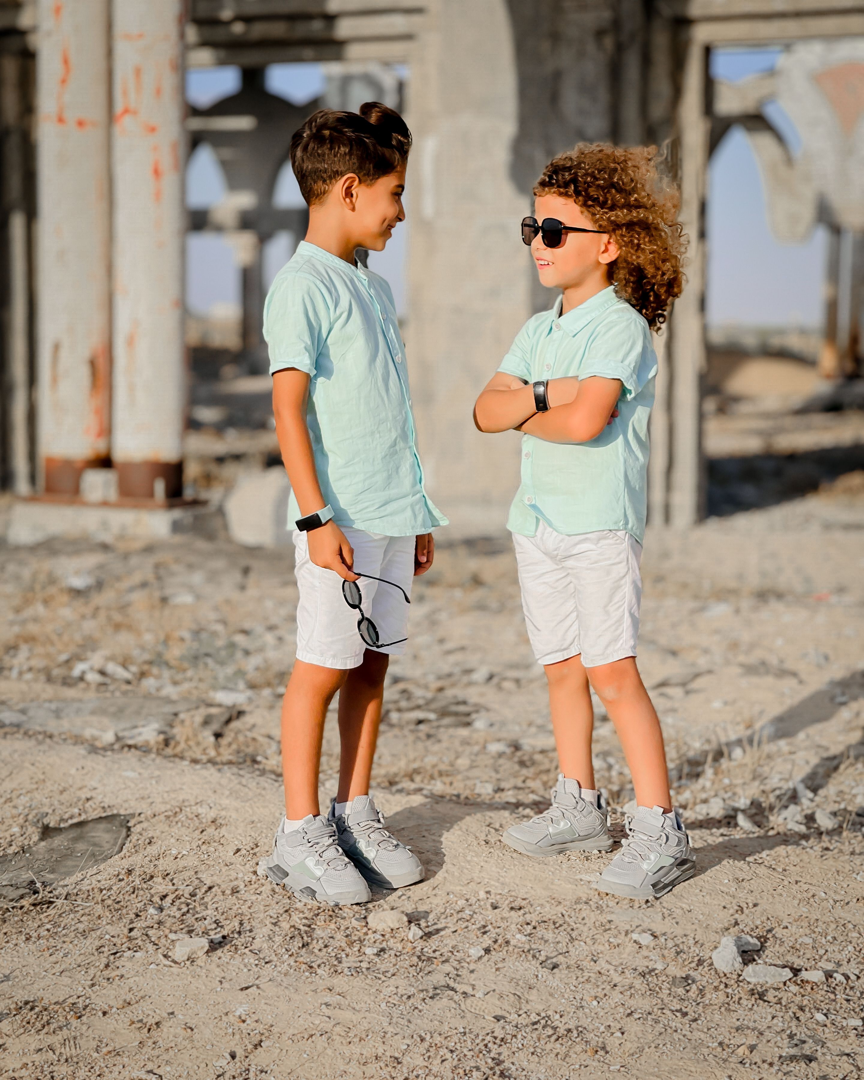Boys Wearing Summer Cloths on Sand · Free Stock Photo