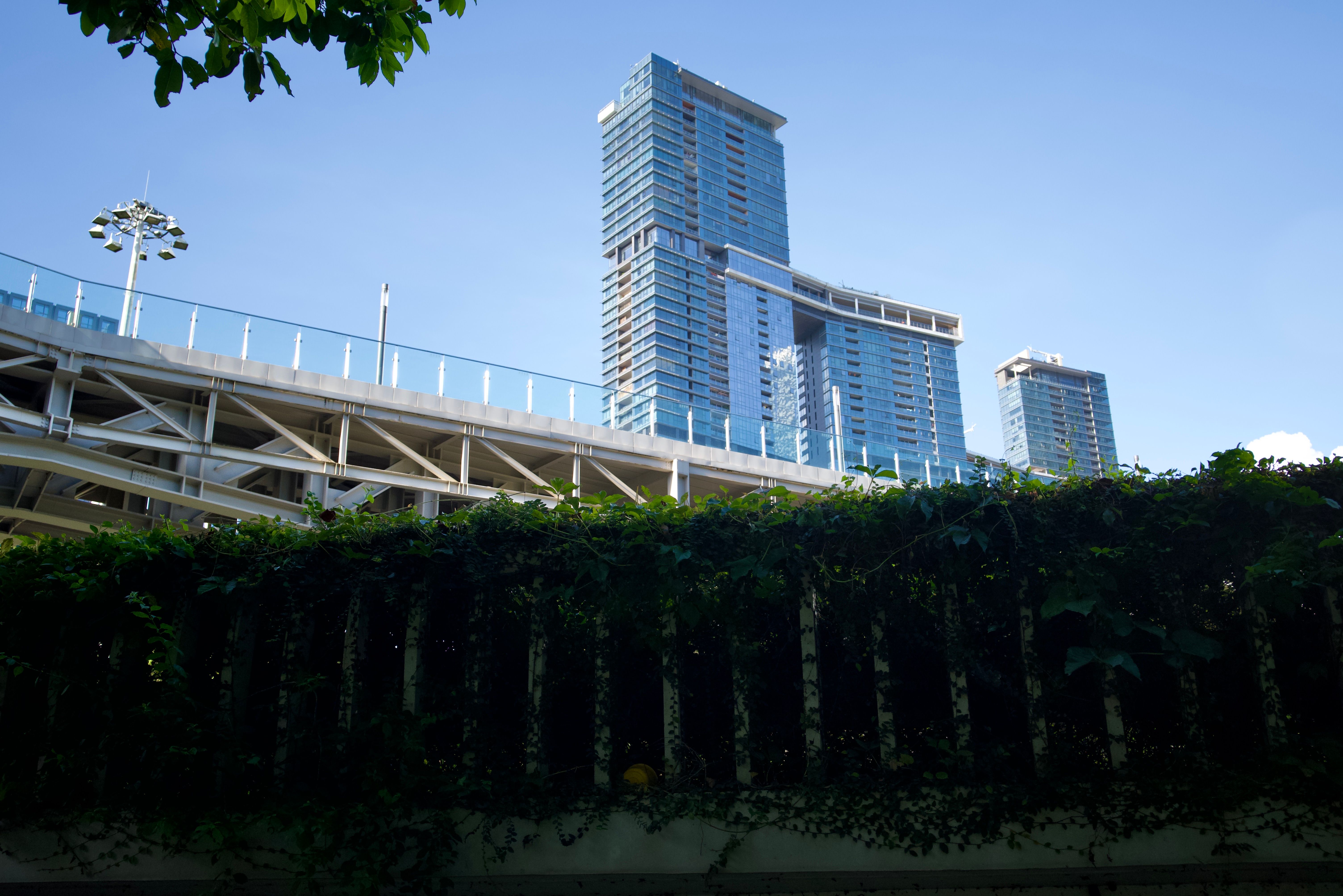 Low-Angle Shot of a High-Rise Concrete Building · Free Stock Photo