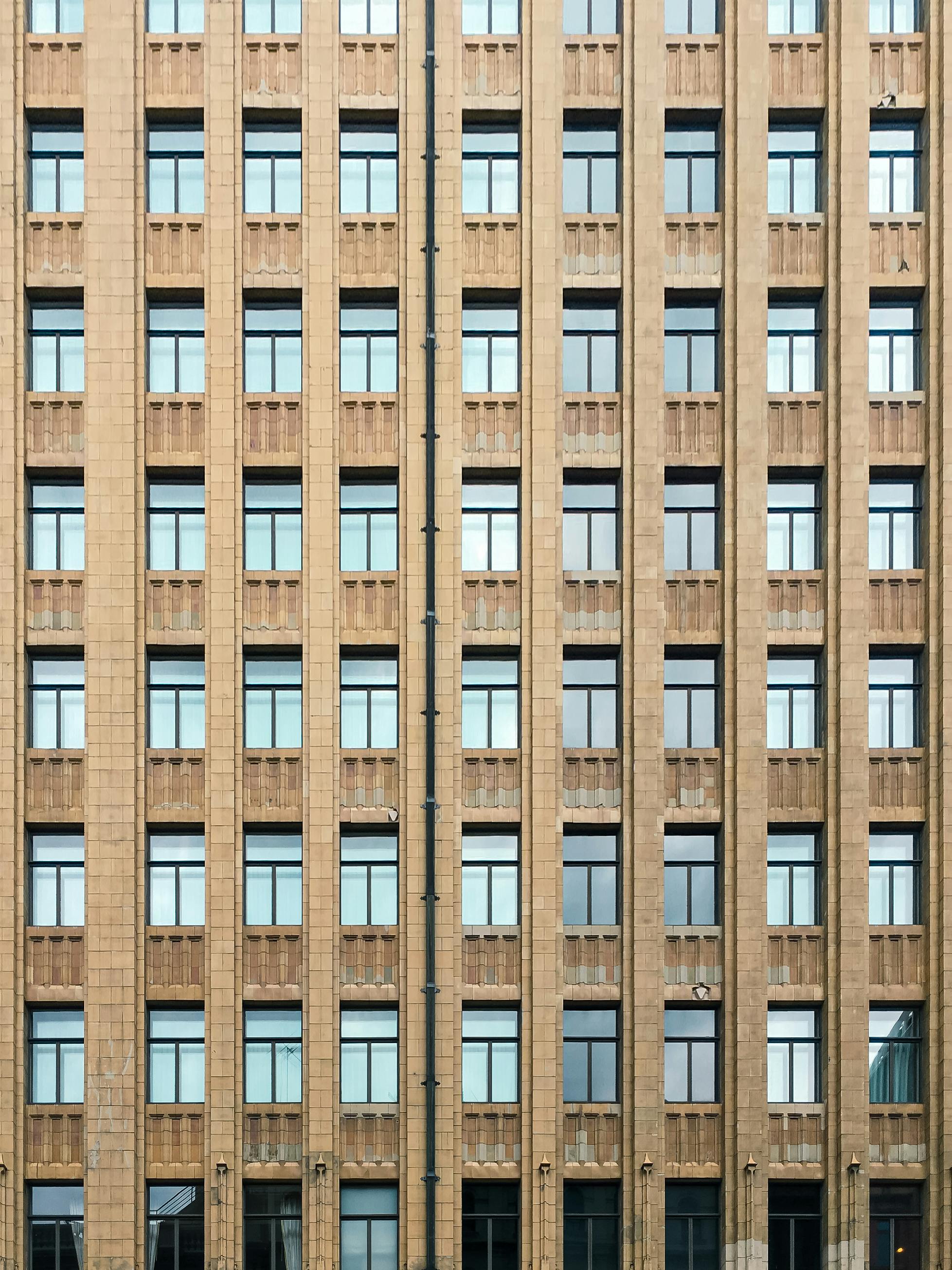 Facade of the Office Building Divided by a Gutter Downpipe · Free Stock ...