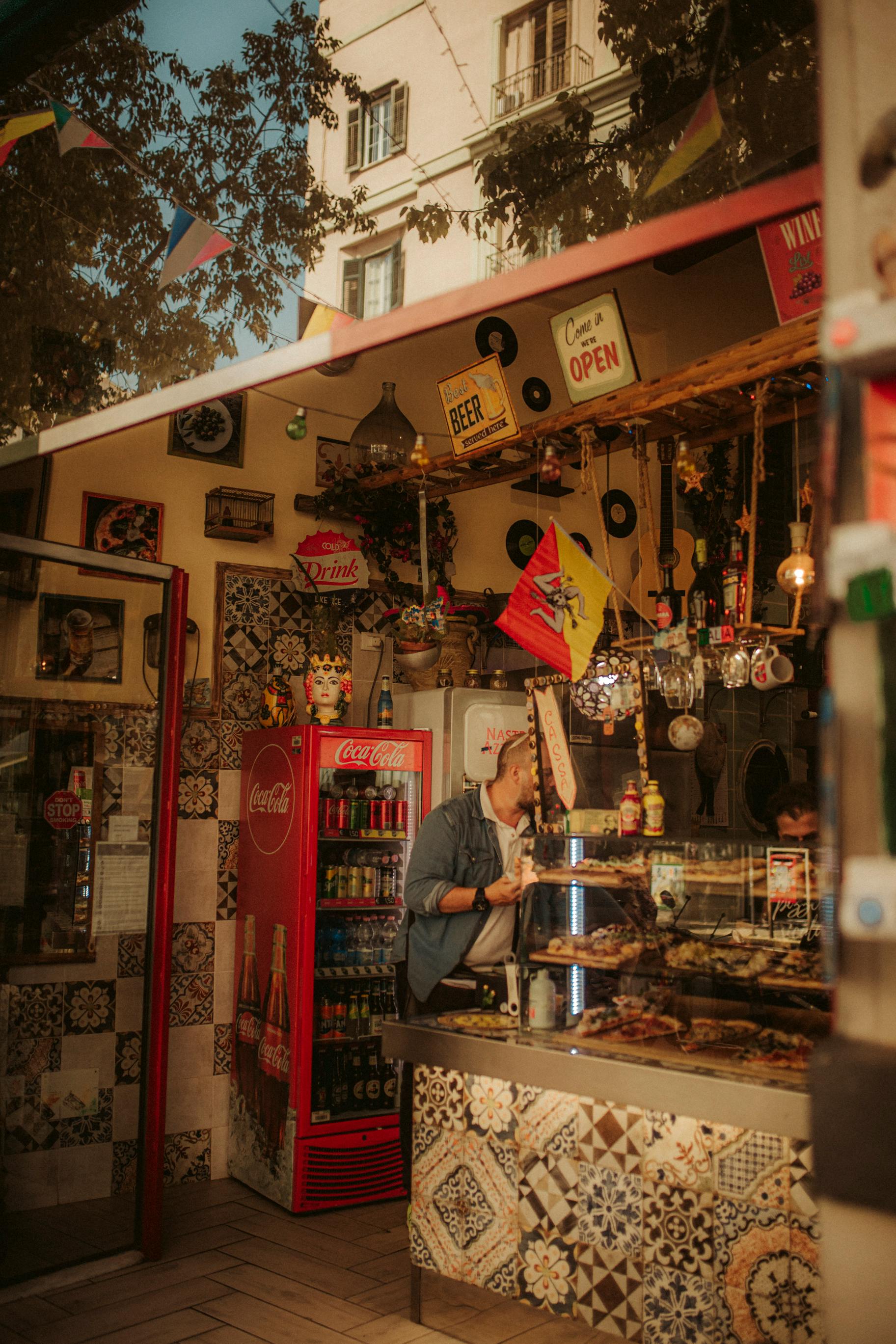 A Man Standing Inside the Shop · Free Stock Photo
