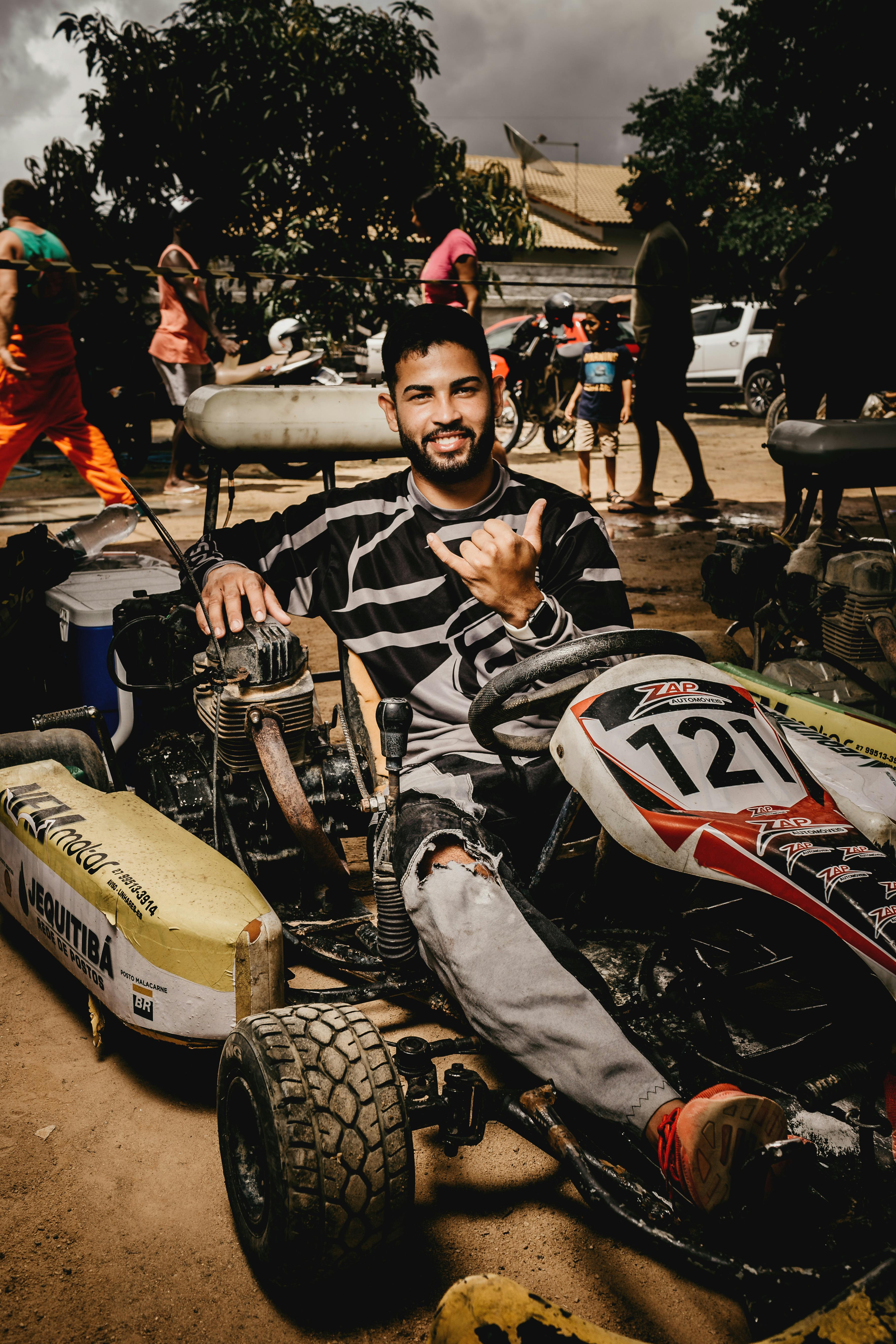 Man Sitting in Racing Cart · Free Stock Photo