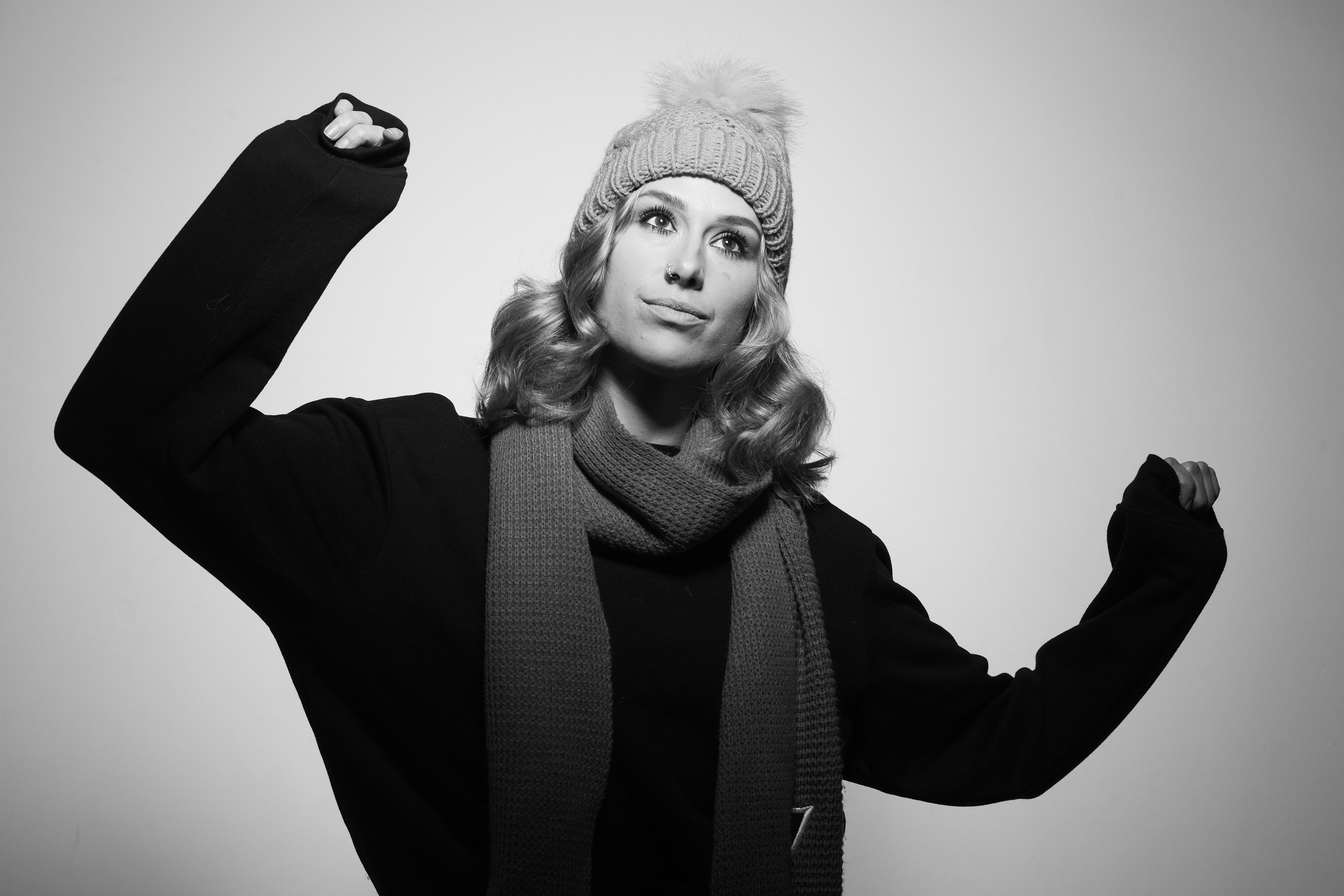 Grayscale Photo of a Woman in Winter Clothes · Free Stock Photo