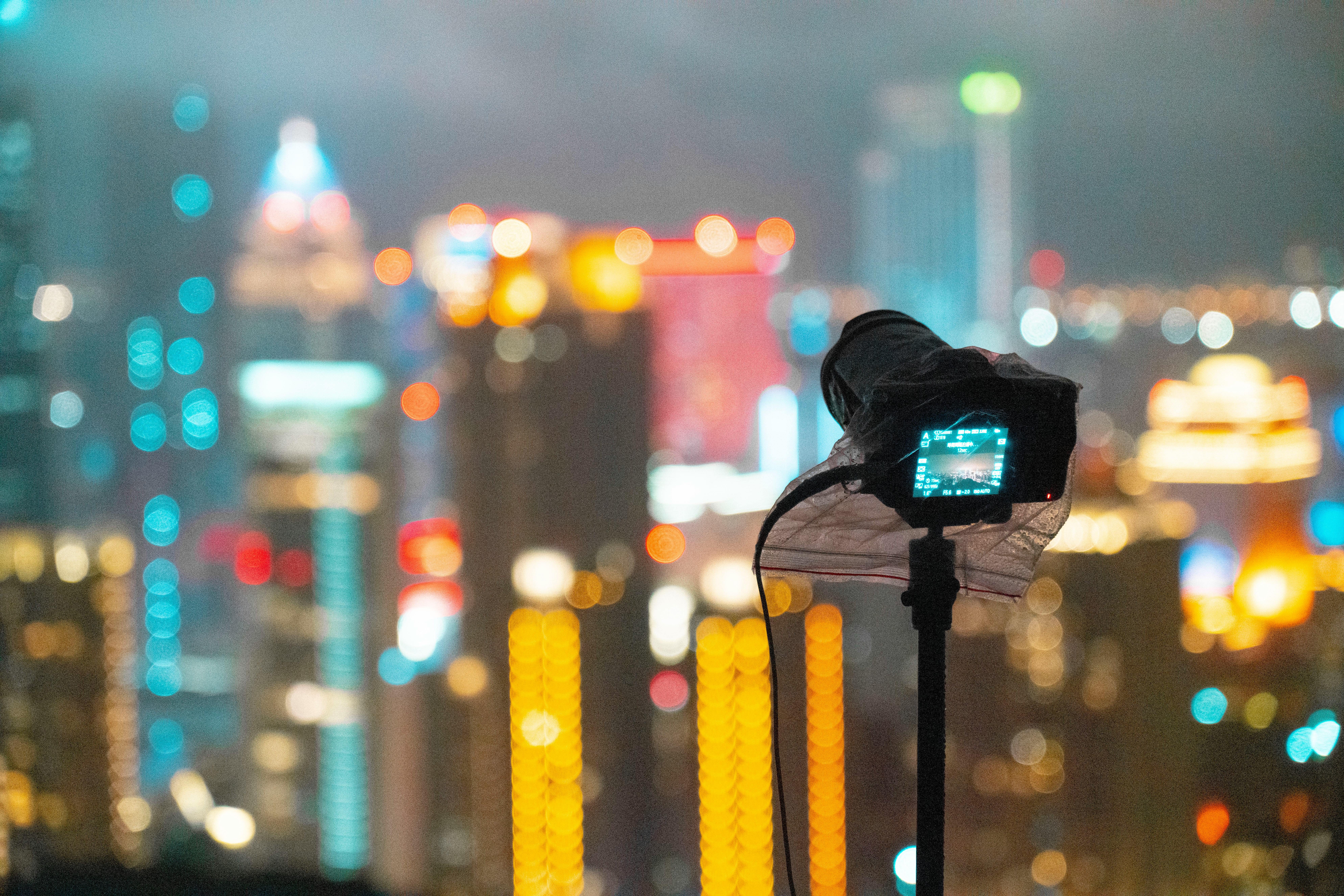 Professional Camera Filming Night Illuminated City · Free Stock Photo