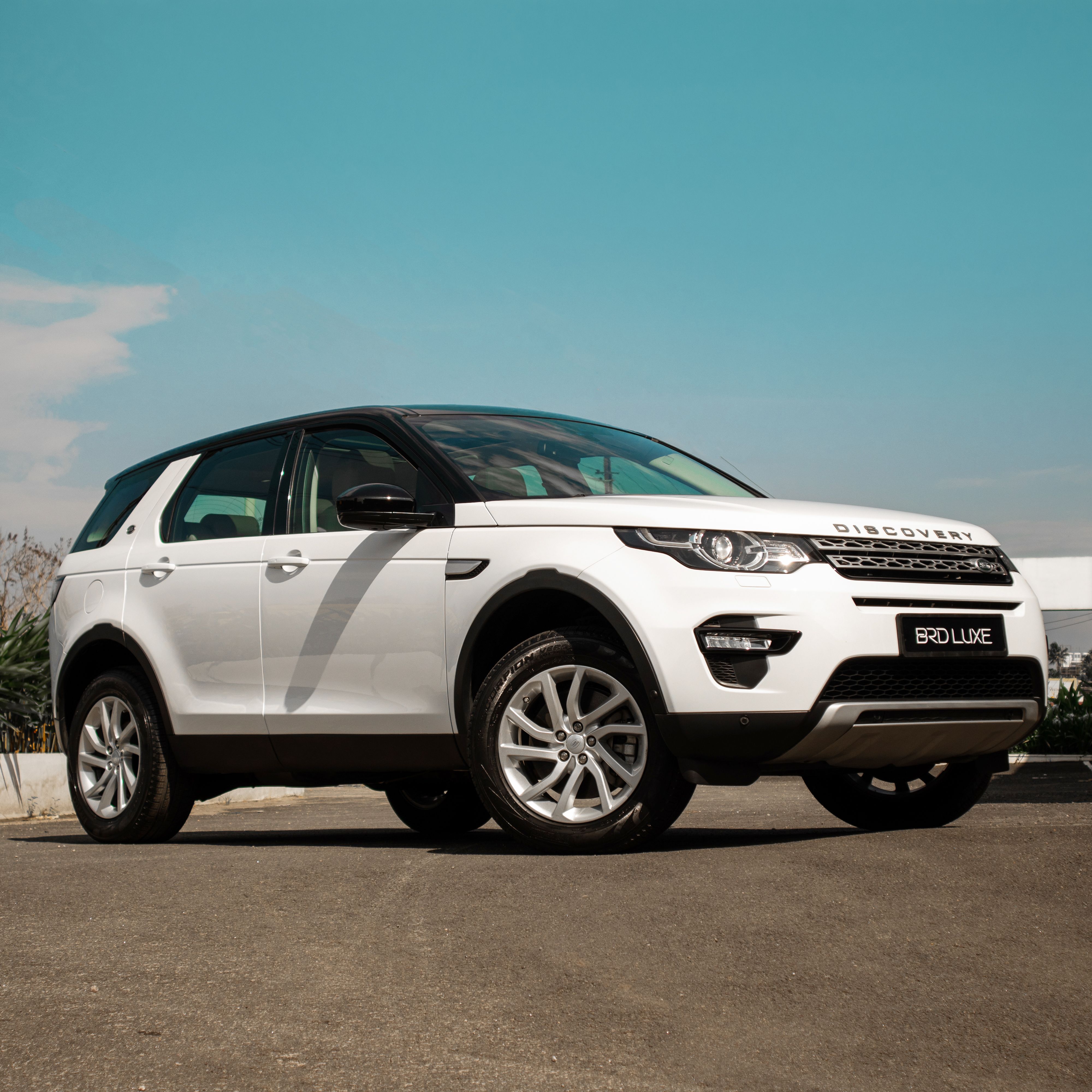 White Suv Vehicle on the Road · Free Stock Photo