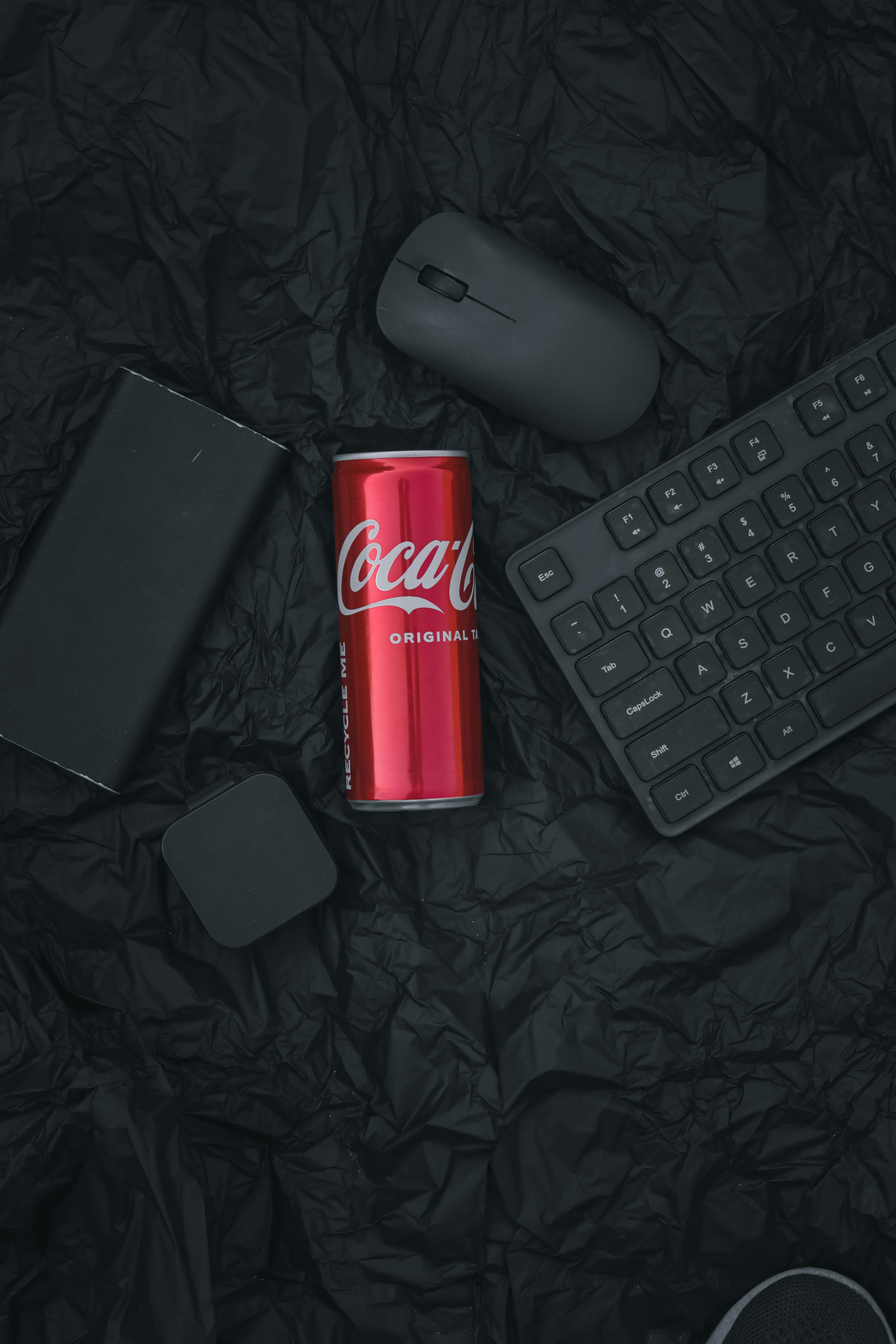 Coca Cola among Peripheral Devices · Free Stock Photo
