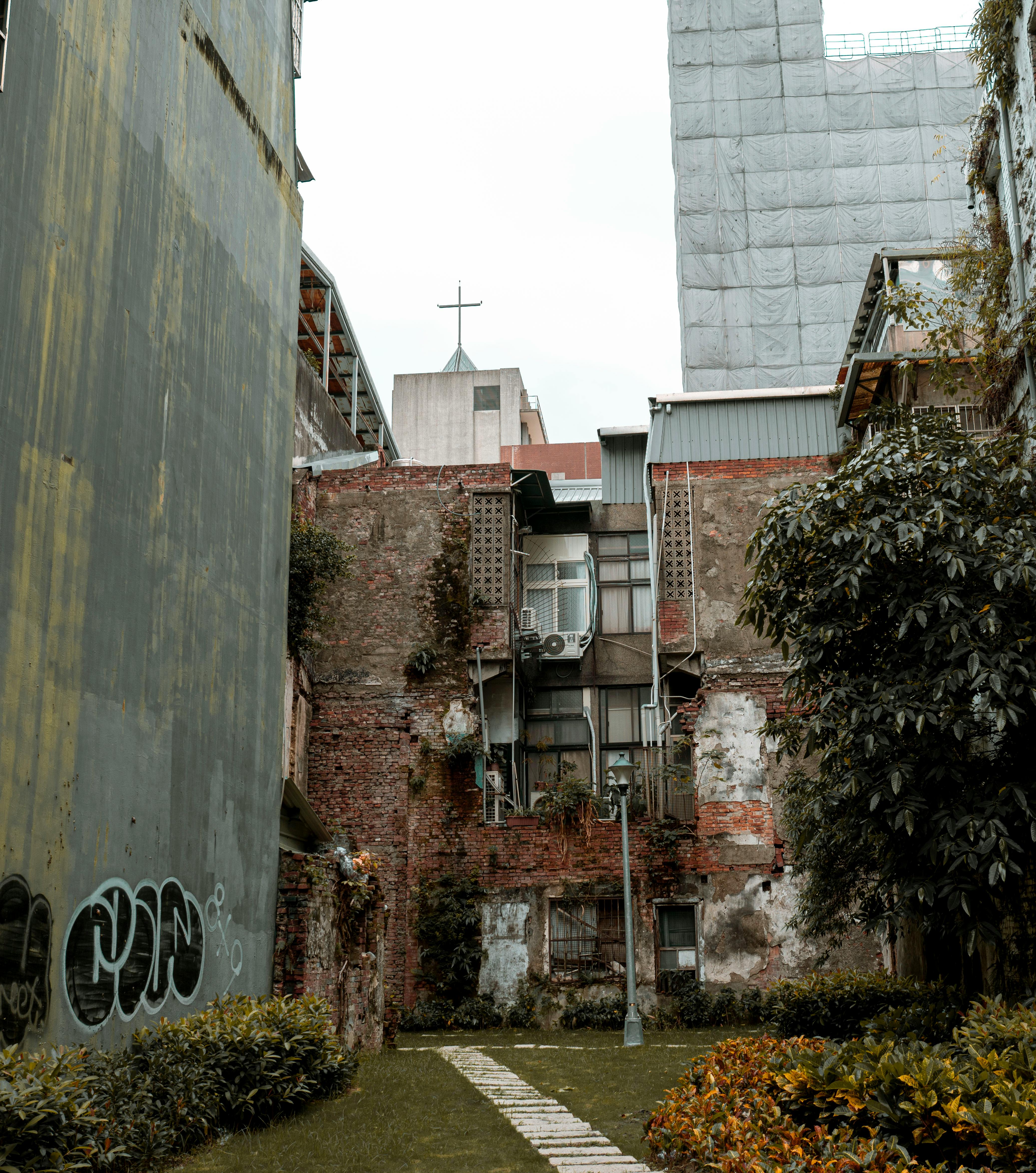 Graffiti Vandalism on Neglected Residential Building · Free Stock Photo