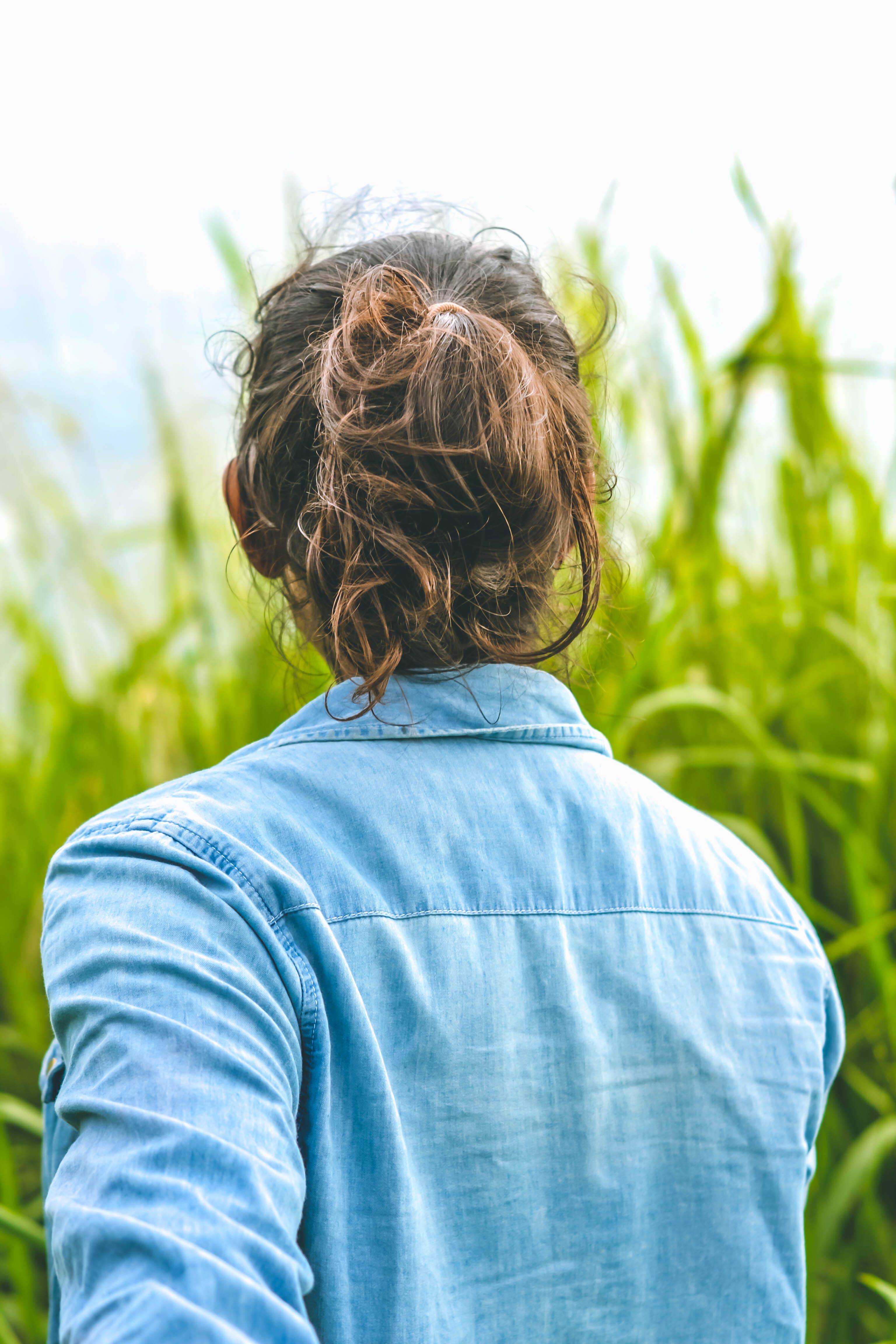 Woman with her Hair Tied Back · Free Stock Photo