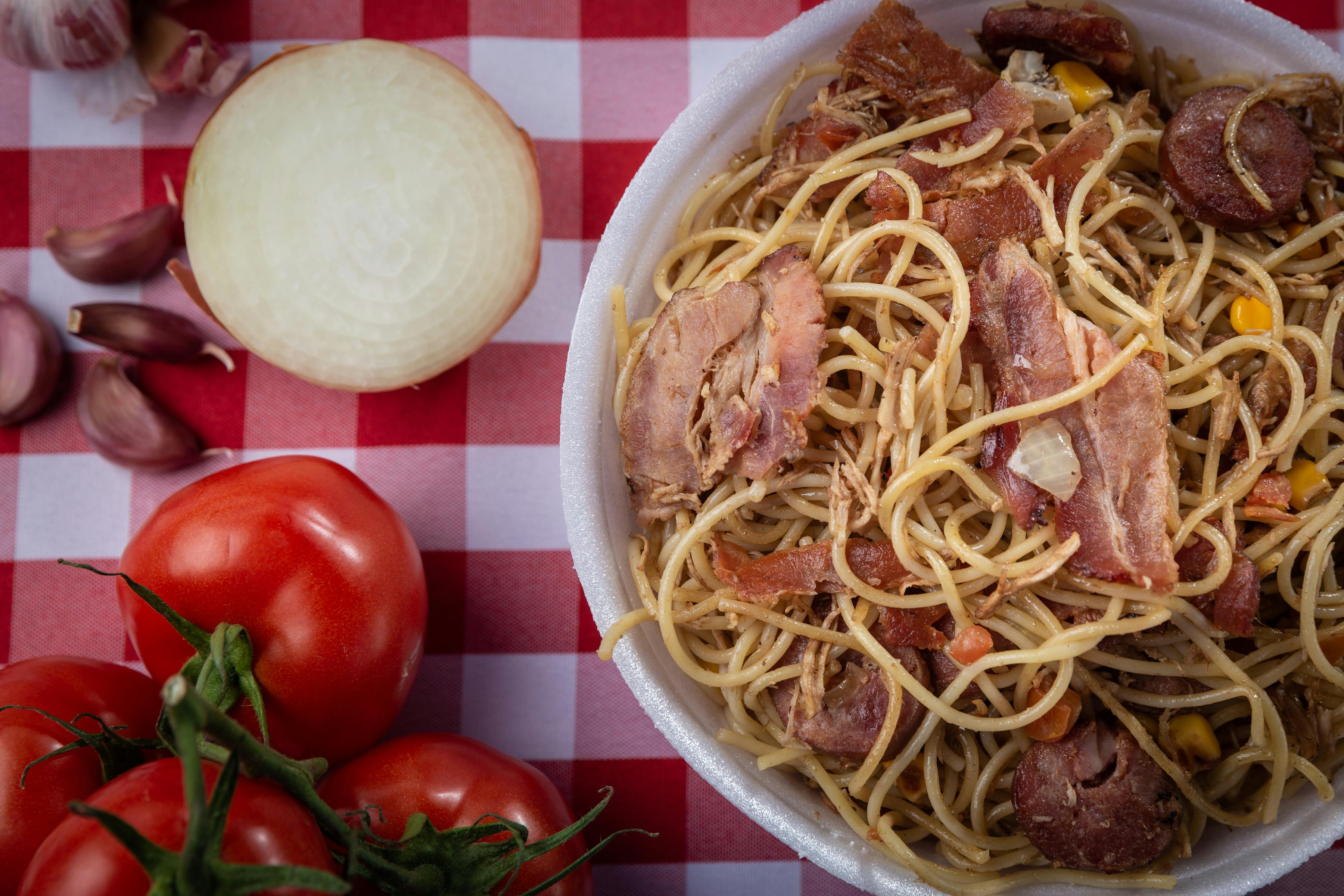 Top View of Spaghetti Pasta with Tomato Sauce · Free Stock Photo