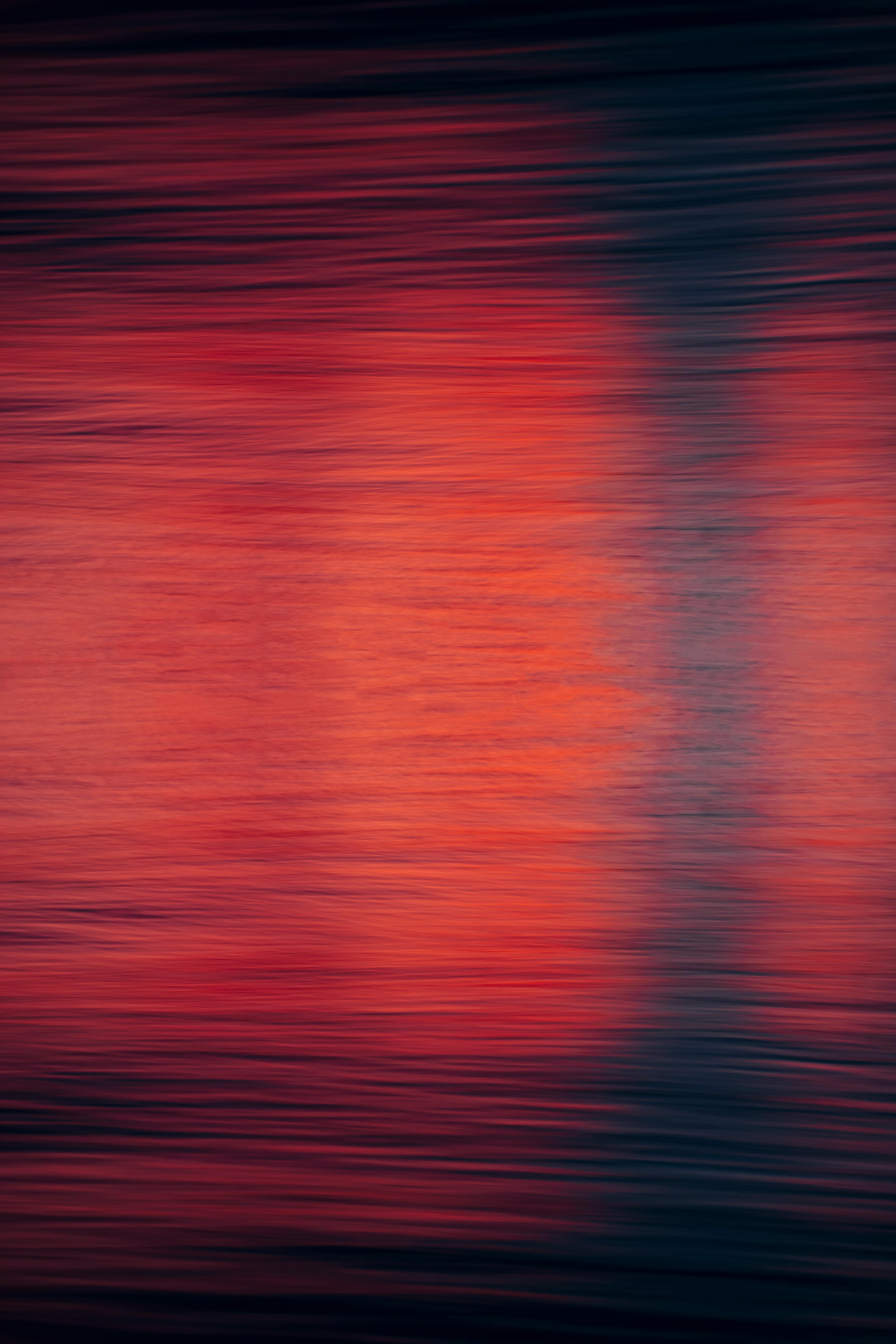 Red Sunlit on Water · Free Stock Photo