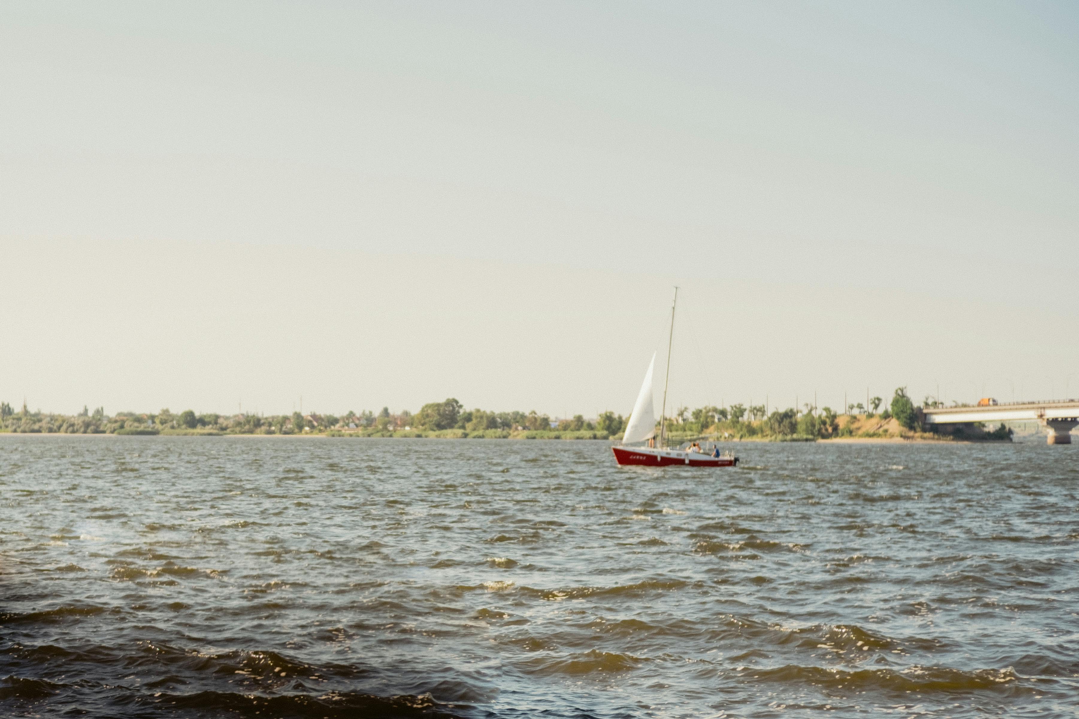 Sailing Boat on Body of Water · Free Stock Photo