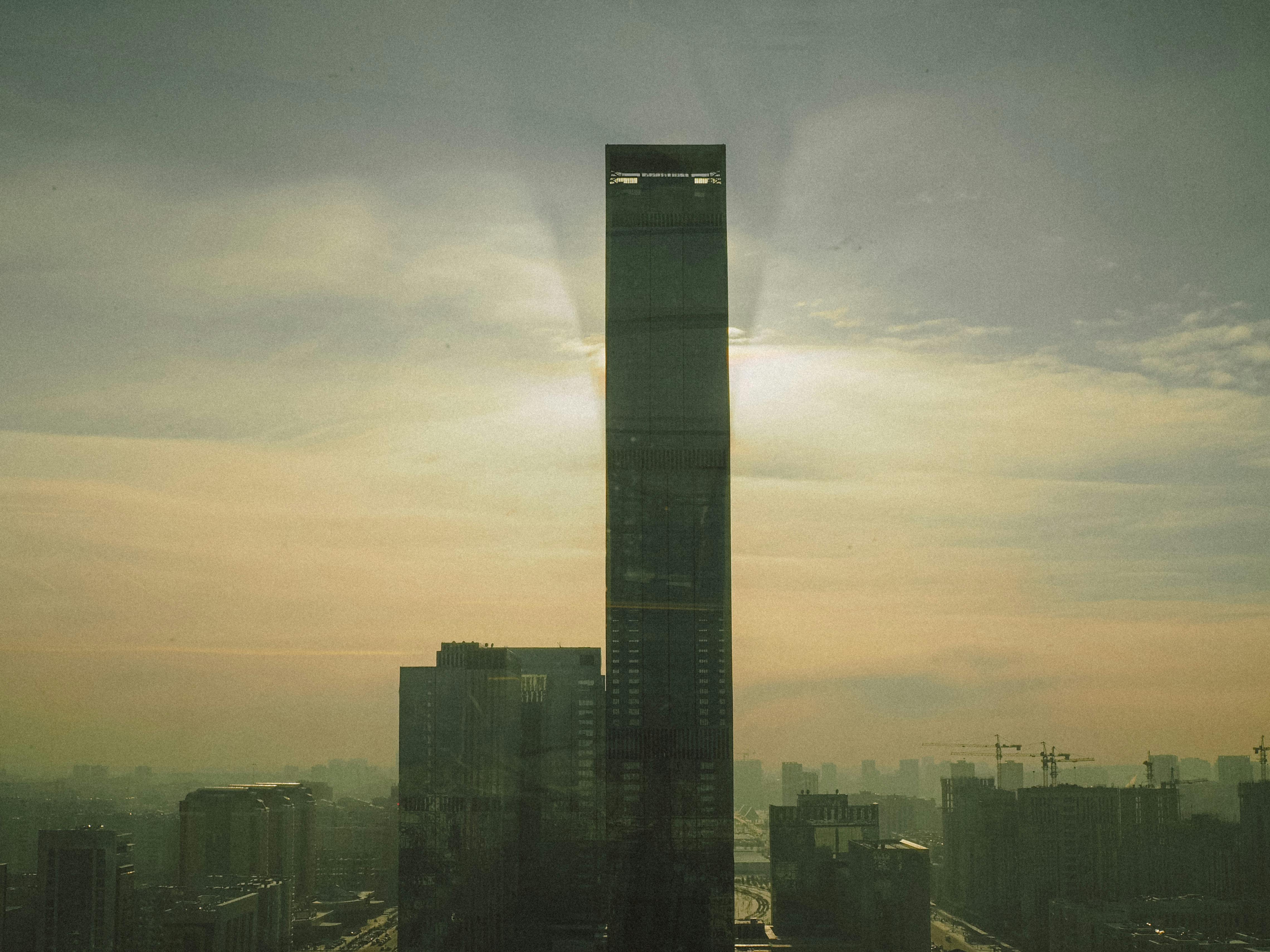 Photo of City Buildings and Skyscraper During Sunset · Free Stock Photo