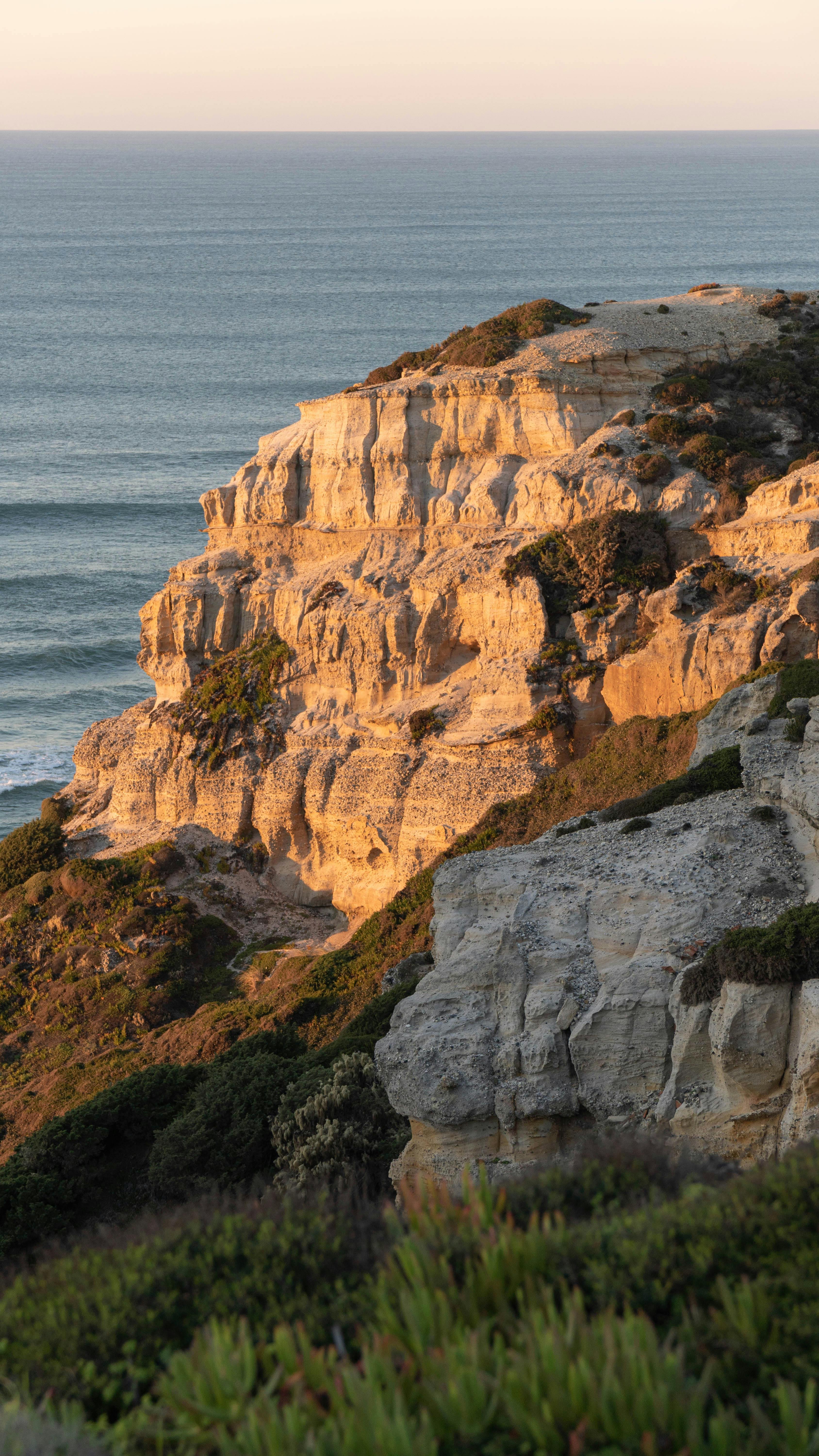 An Aerial Photography of a Rock Formation Near the Ocean · Free Stock Photo