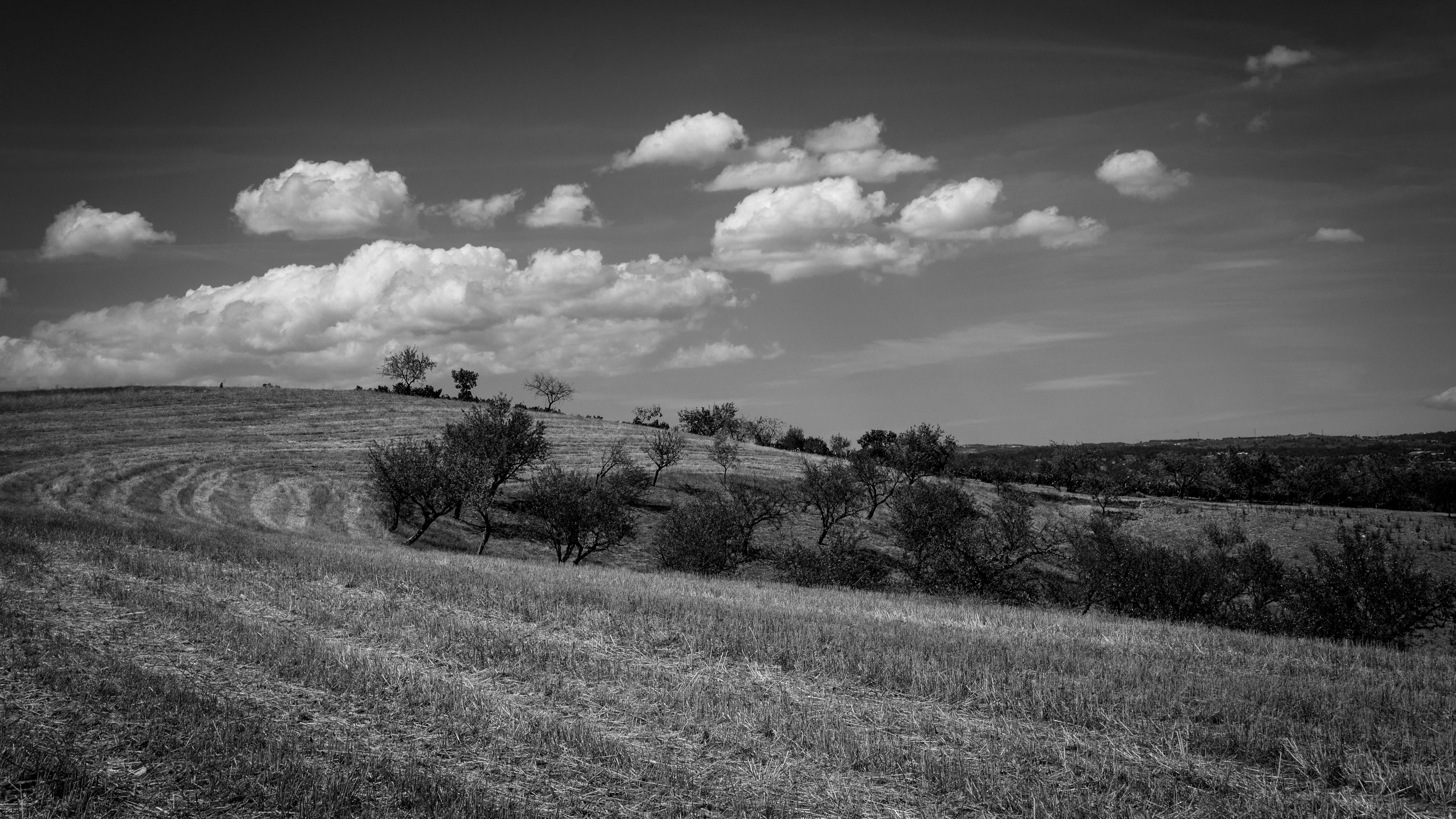 Clouds over Field on Hill · Free Stock Photo