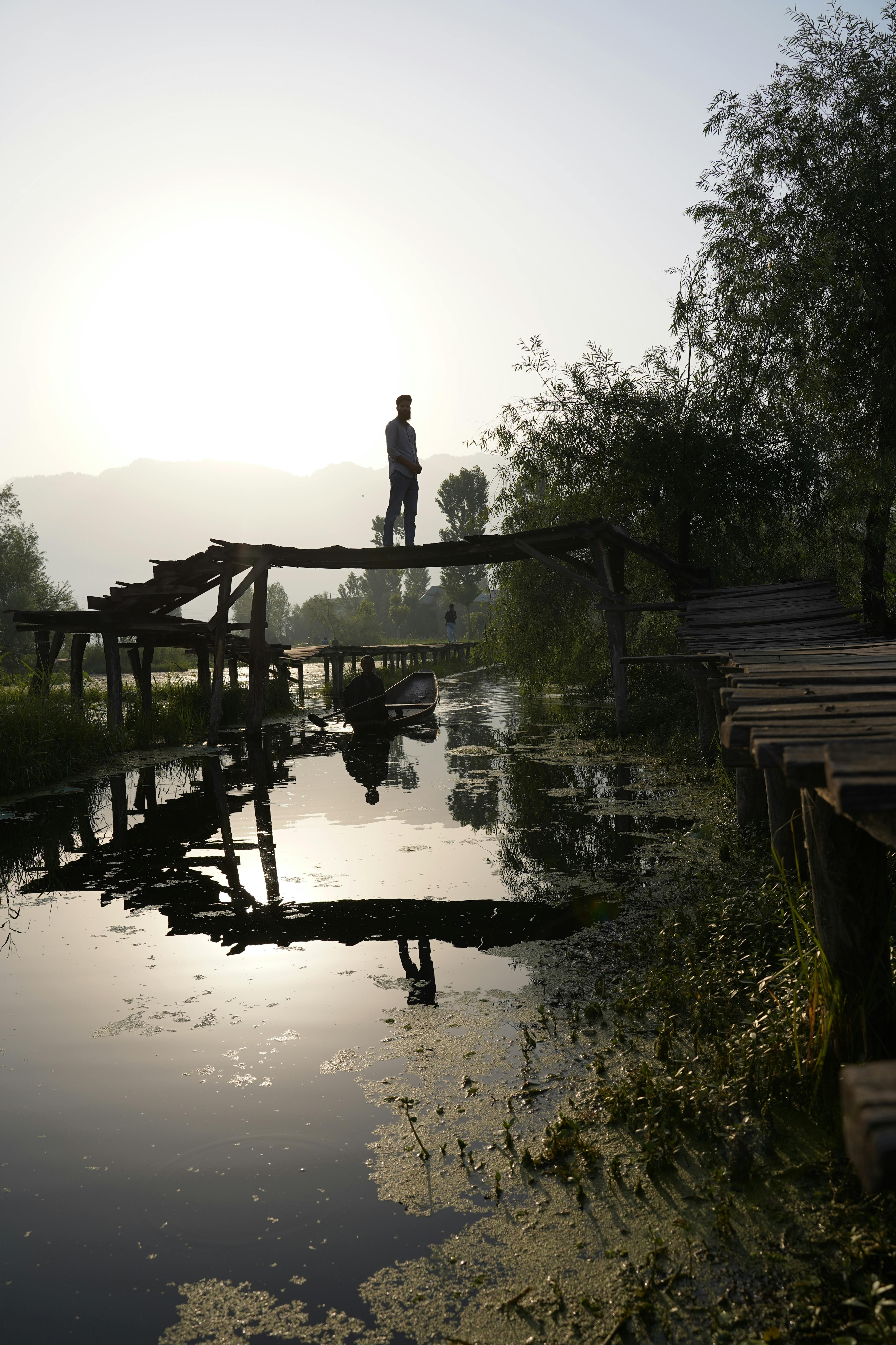 A Man Standing on the Bridge · Free Stock Photo