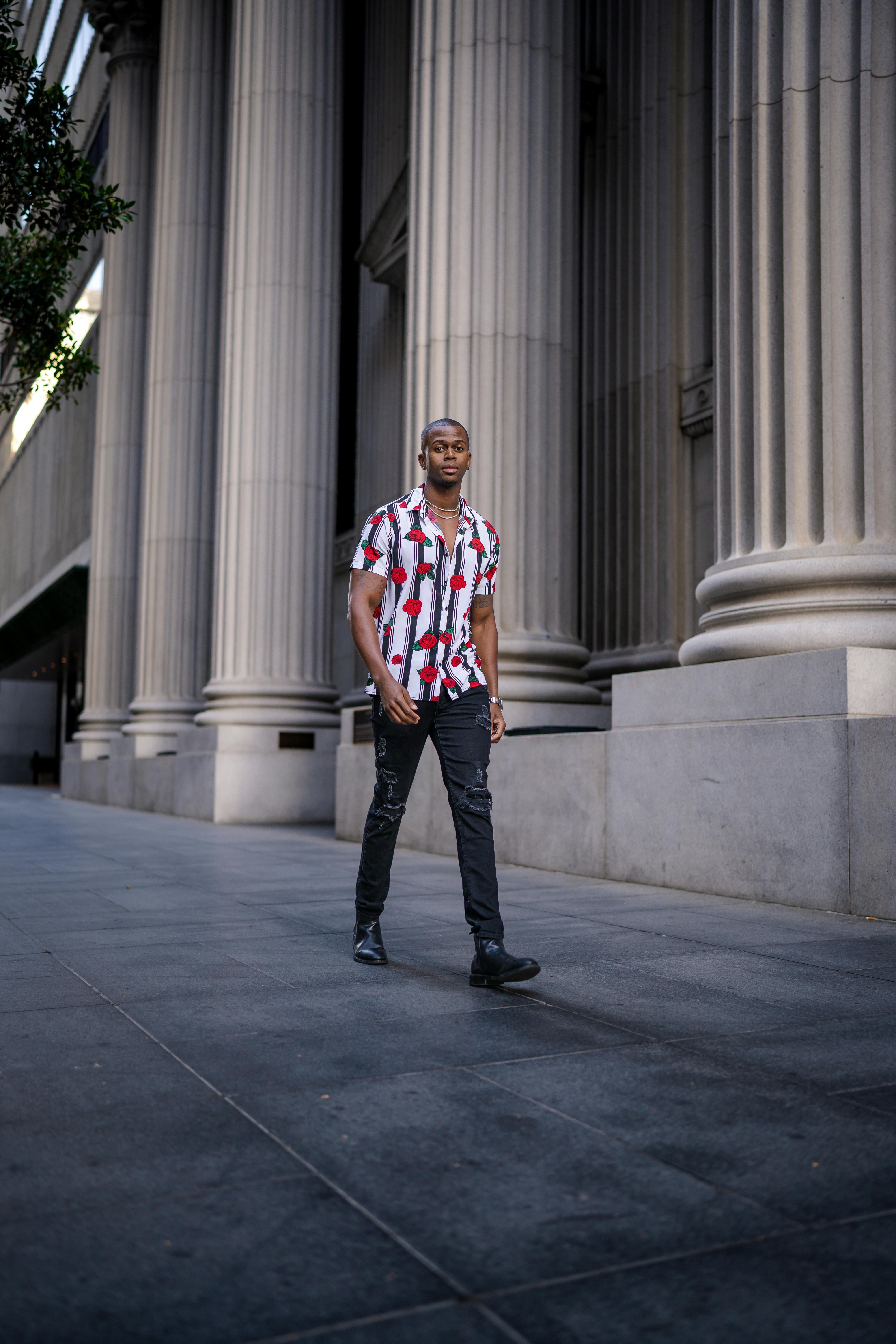 Walking Man in a Preppy Shirt · Free Stock Photo
