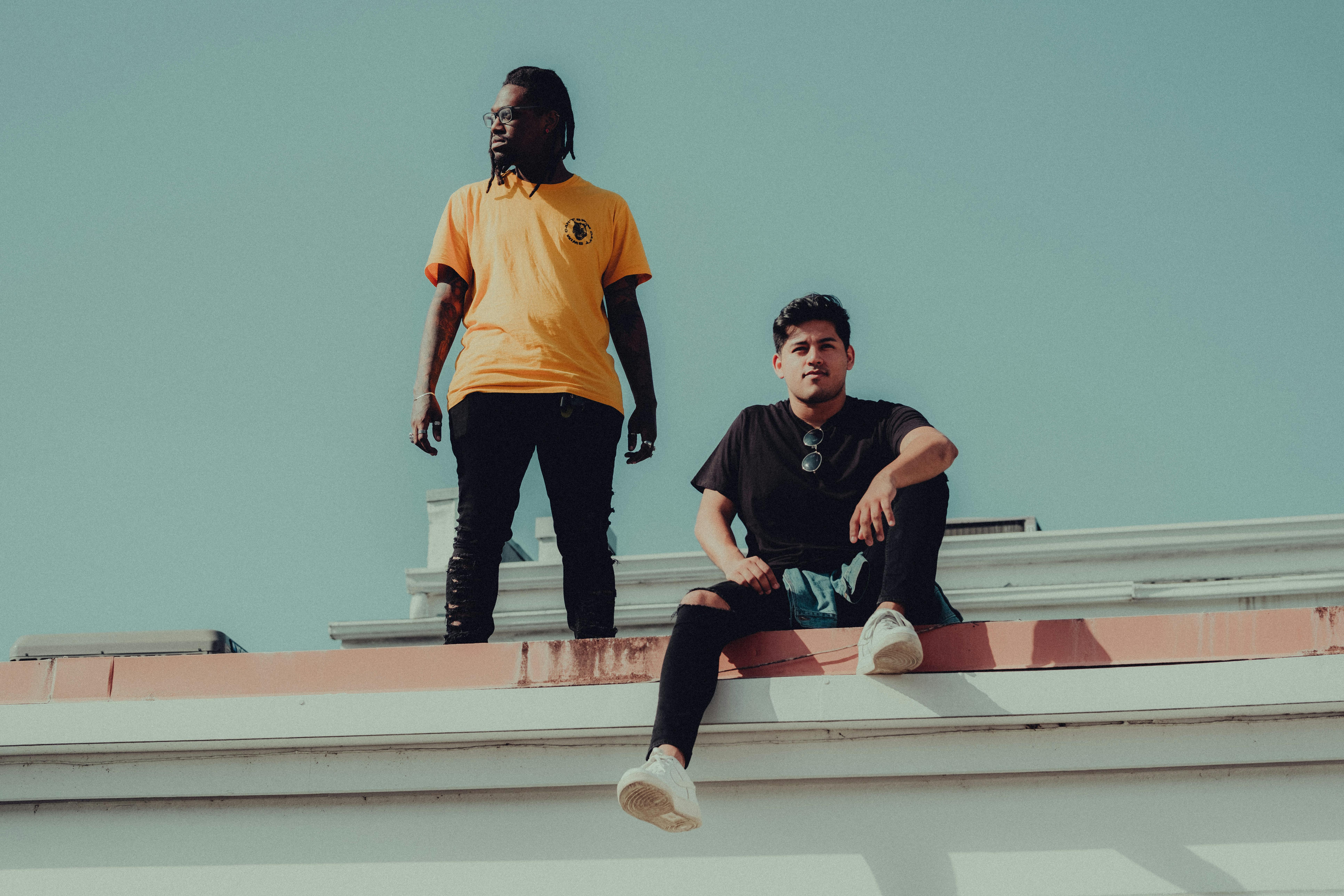 Two Men on the Roof Top · Free Stock Photo