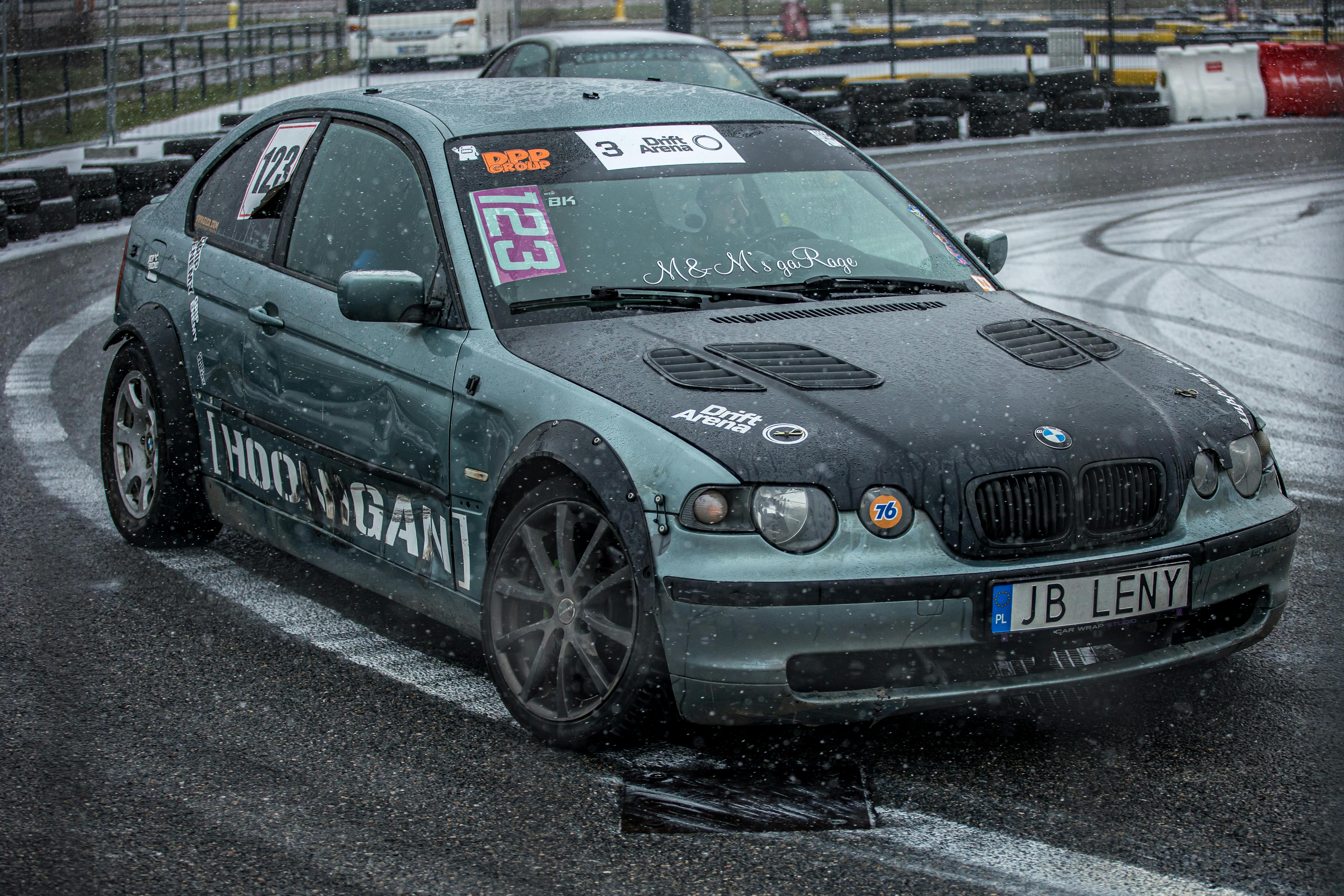 Race Car on Racing Track · Free Stock Photo