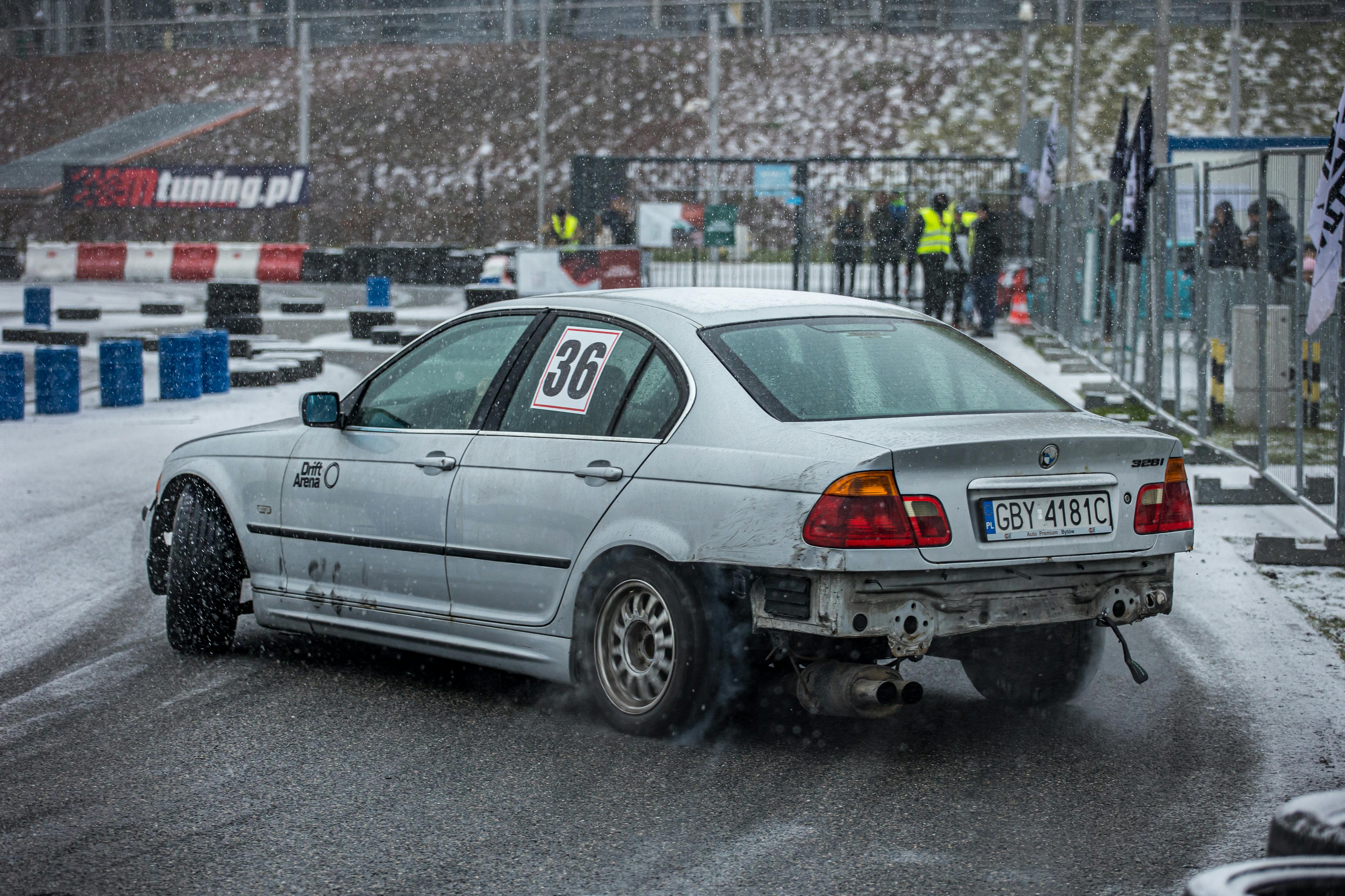 Gray Race Car on Race Track · Free Stock Photo