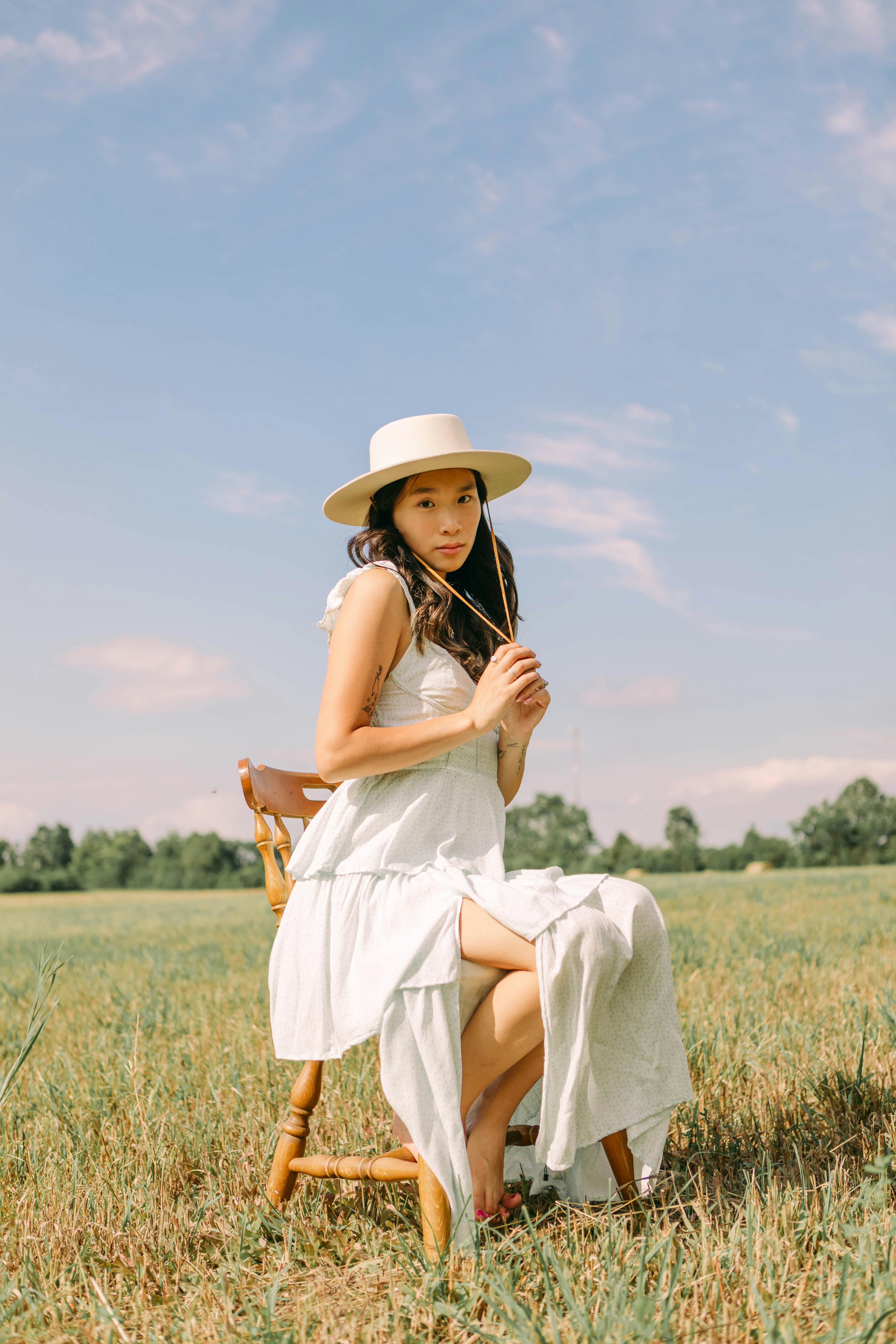 Woman in Folklore Dress and Hat · Free Stock Photo