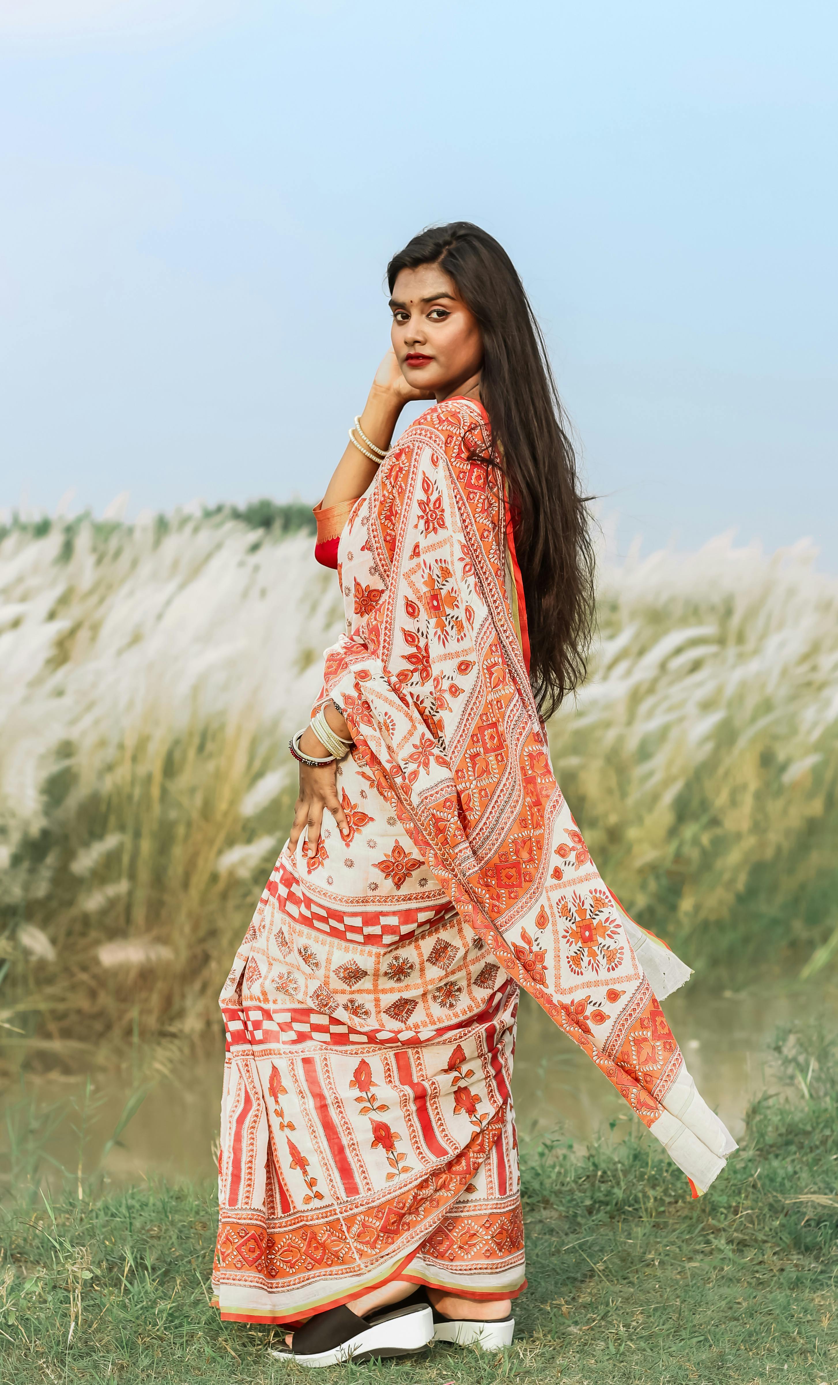 Close-Up Shot of a Beautiful Woman in Traditional Clothing · Free Stock ...