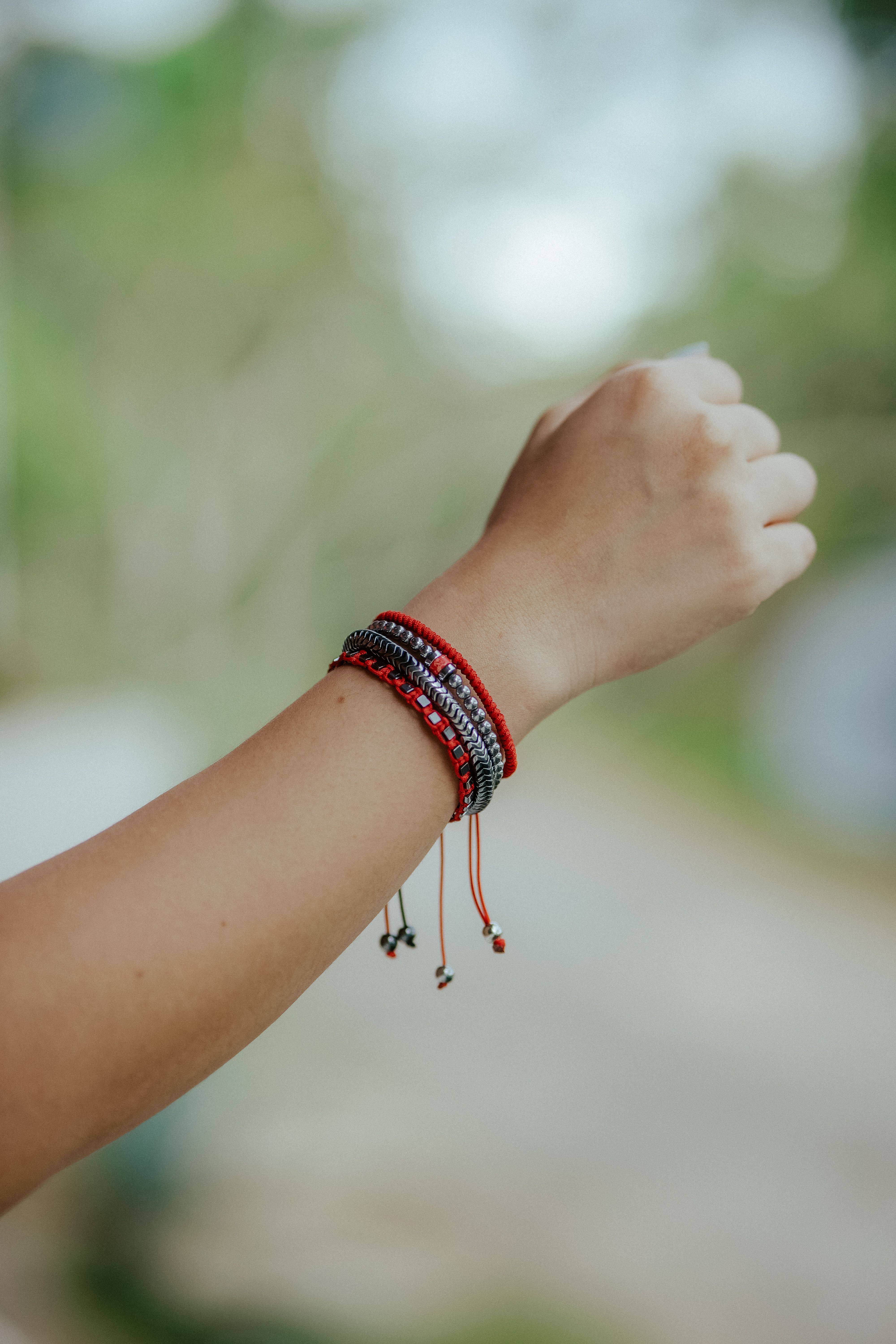 Smiling Woman with Bracelets on her Arm · Free Stock Photo