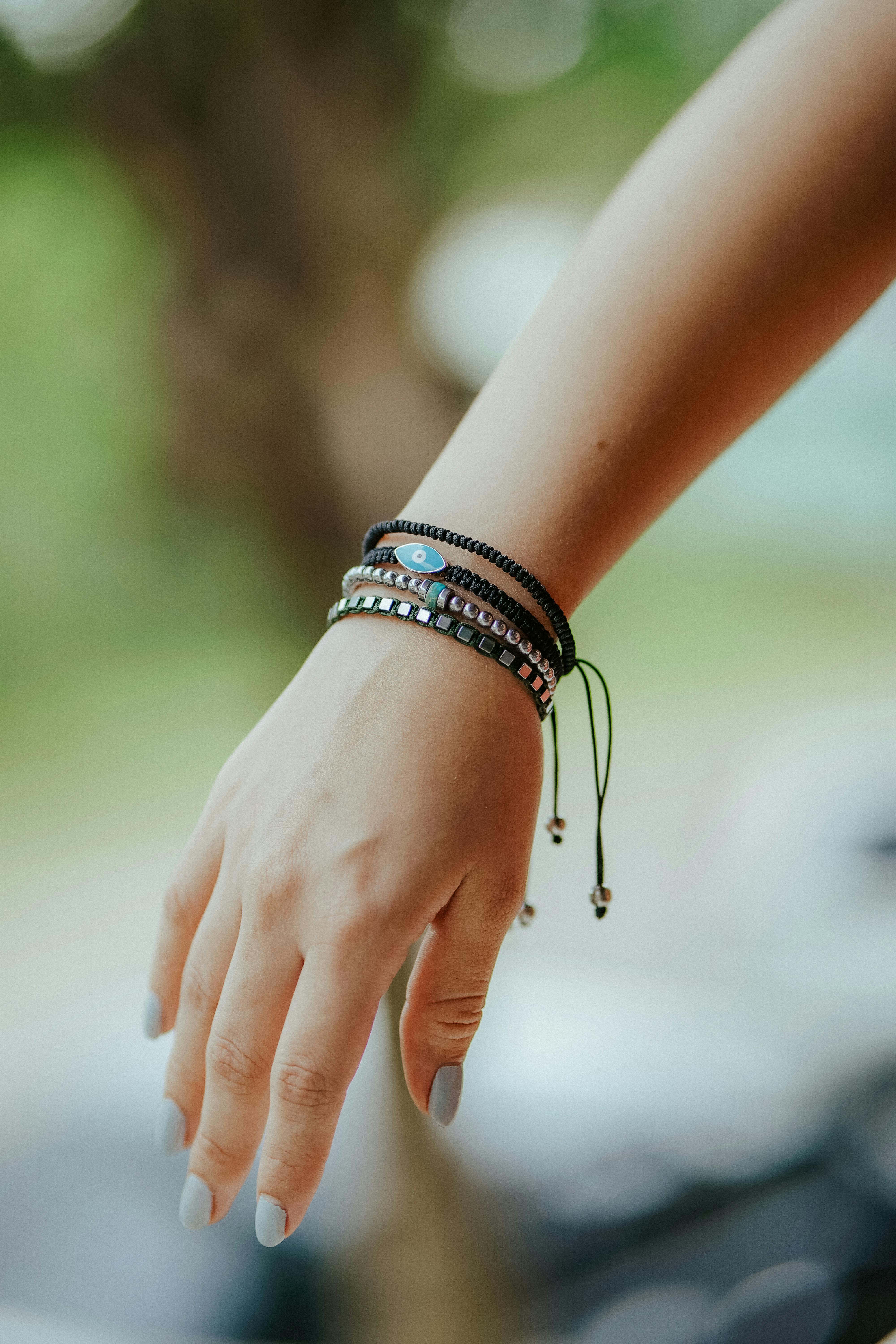 Woman Hand with Bracelets · Free Stock Photo