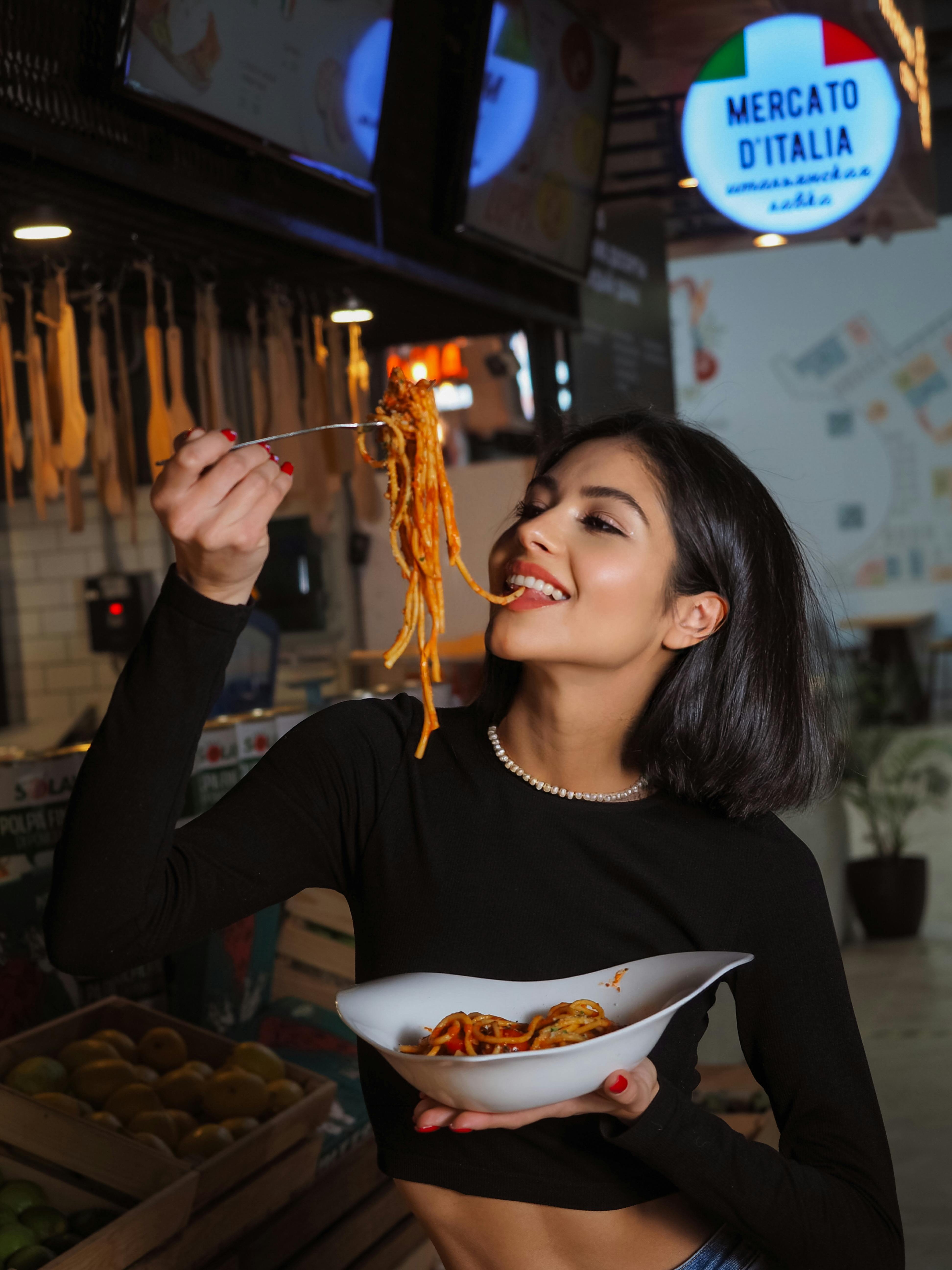 Woman Eating Spaghetti · Free Stock Photo