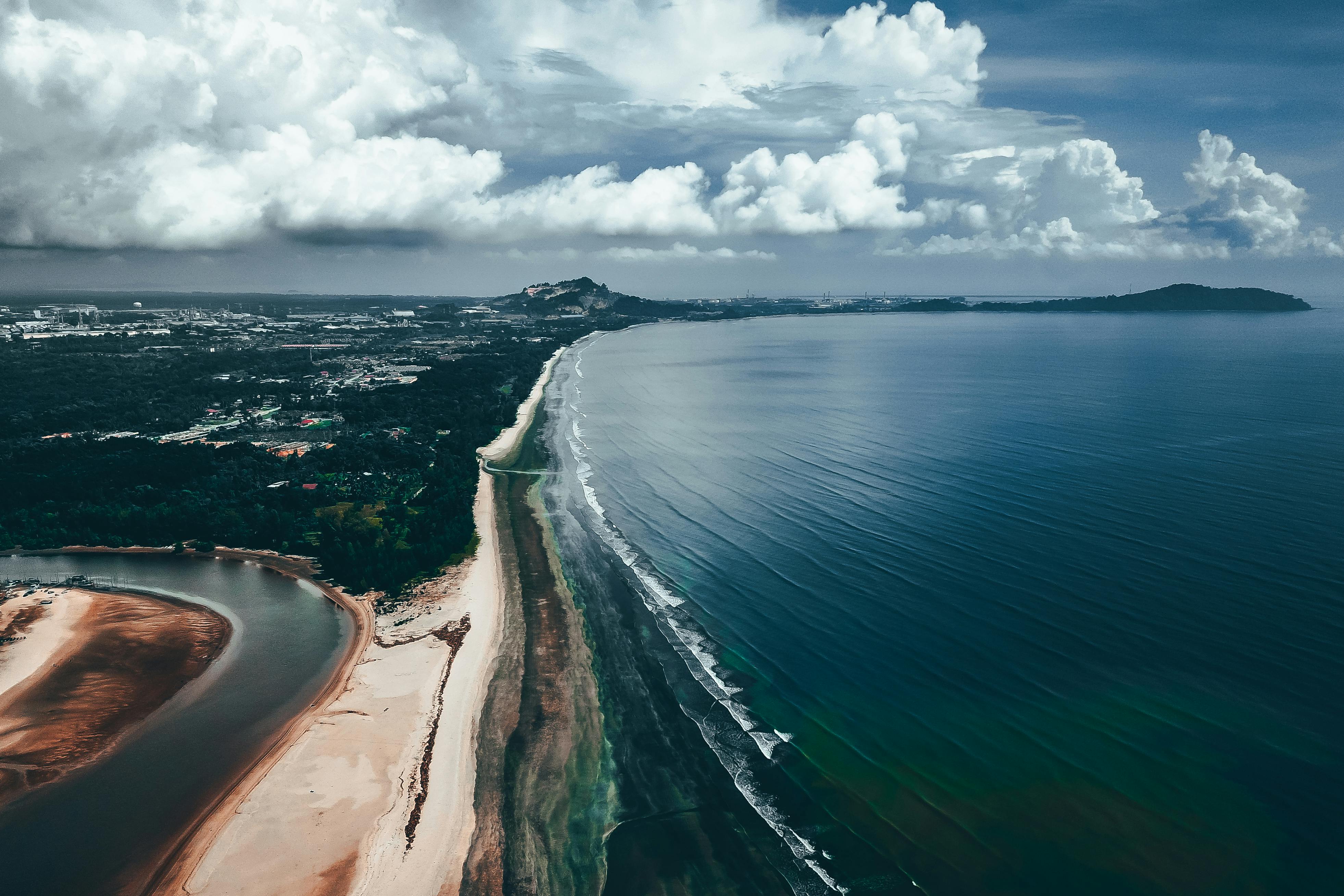 Scenic Photo of the Coastline and a Seaside Town · Free Stock Photo
