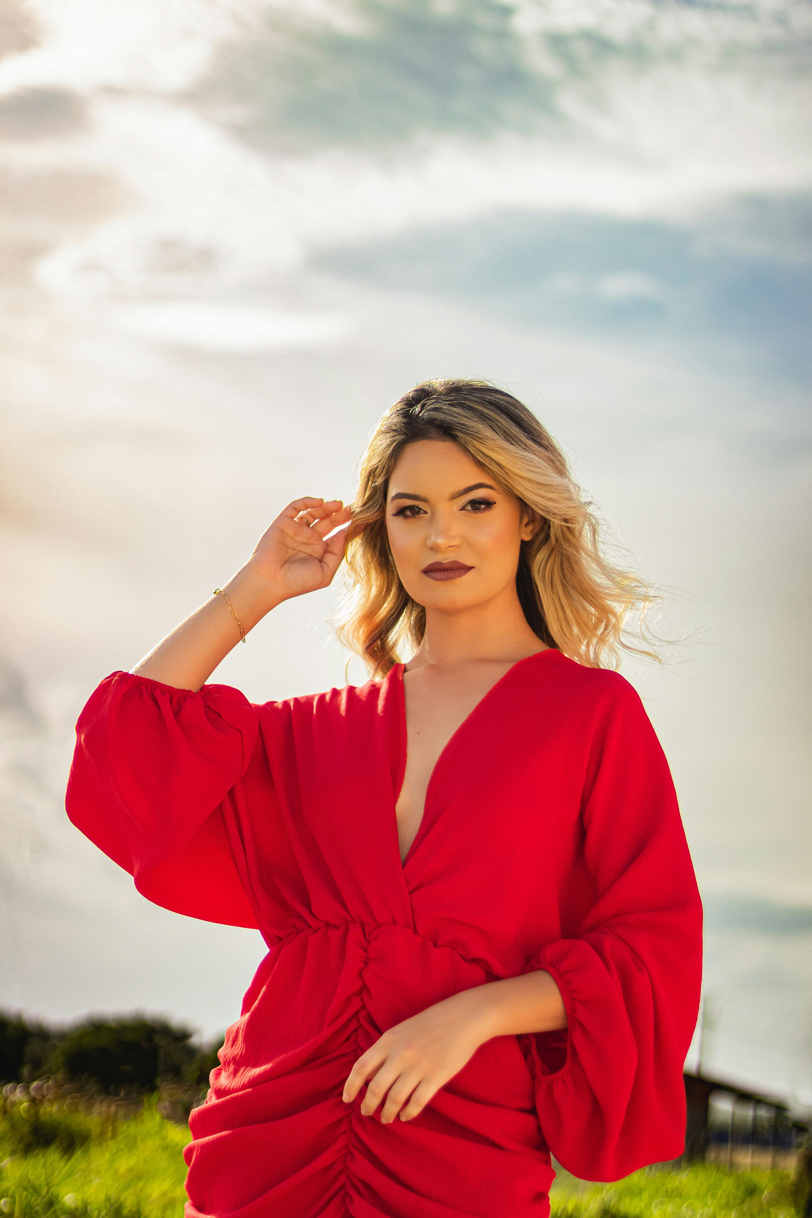 Portrait Of a Blonde Woman In a Red Dress Against the Landscape · Free ...