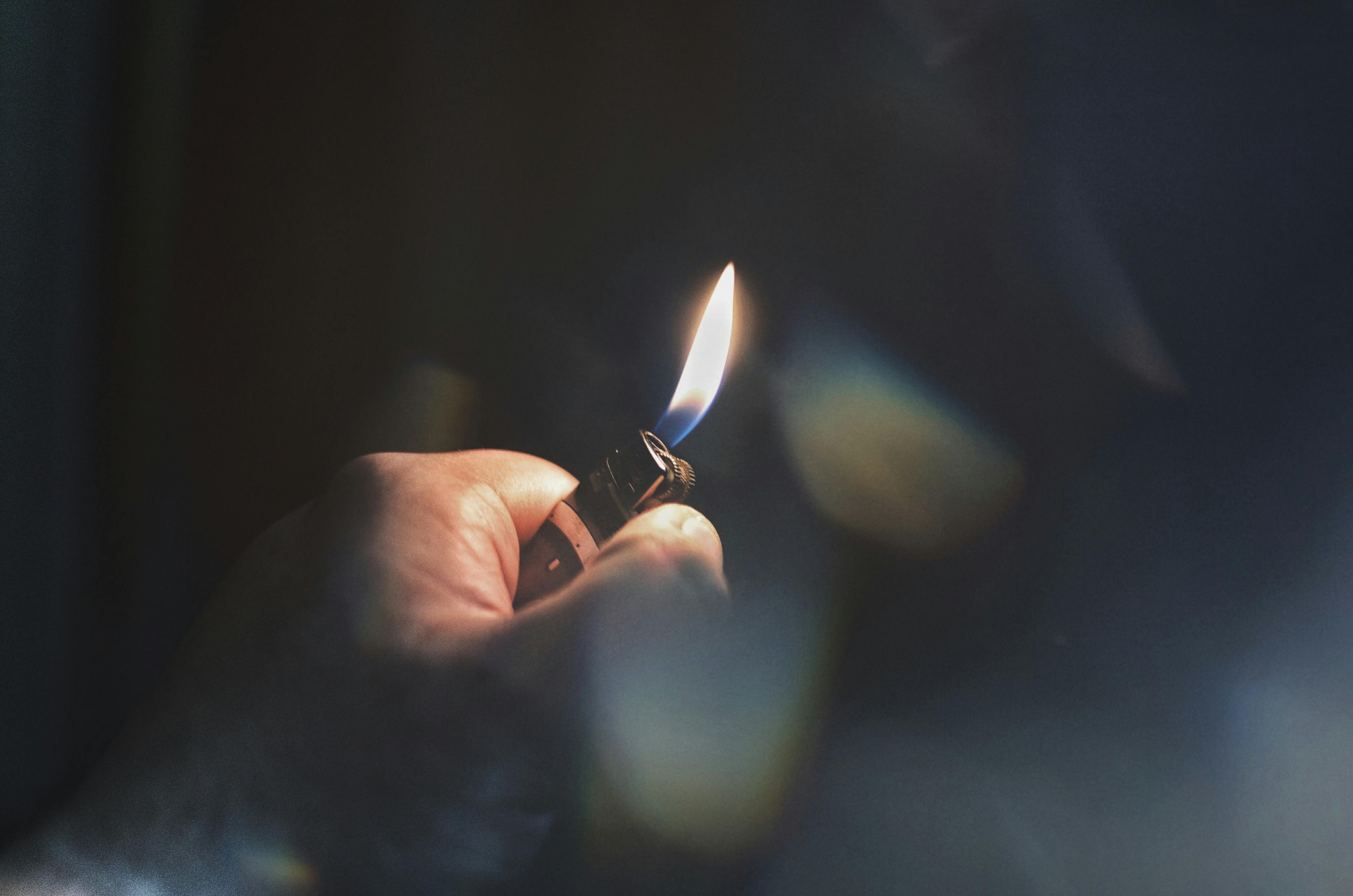 Person Holding Lighter · Free Stock Photo