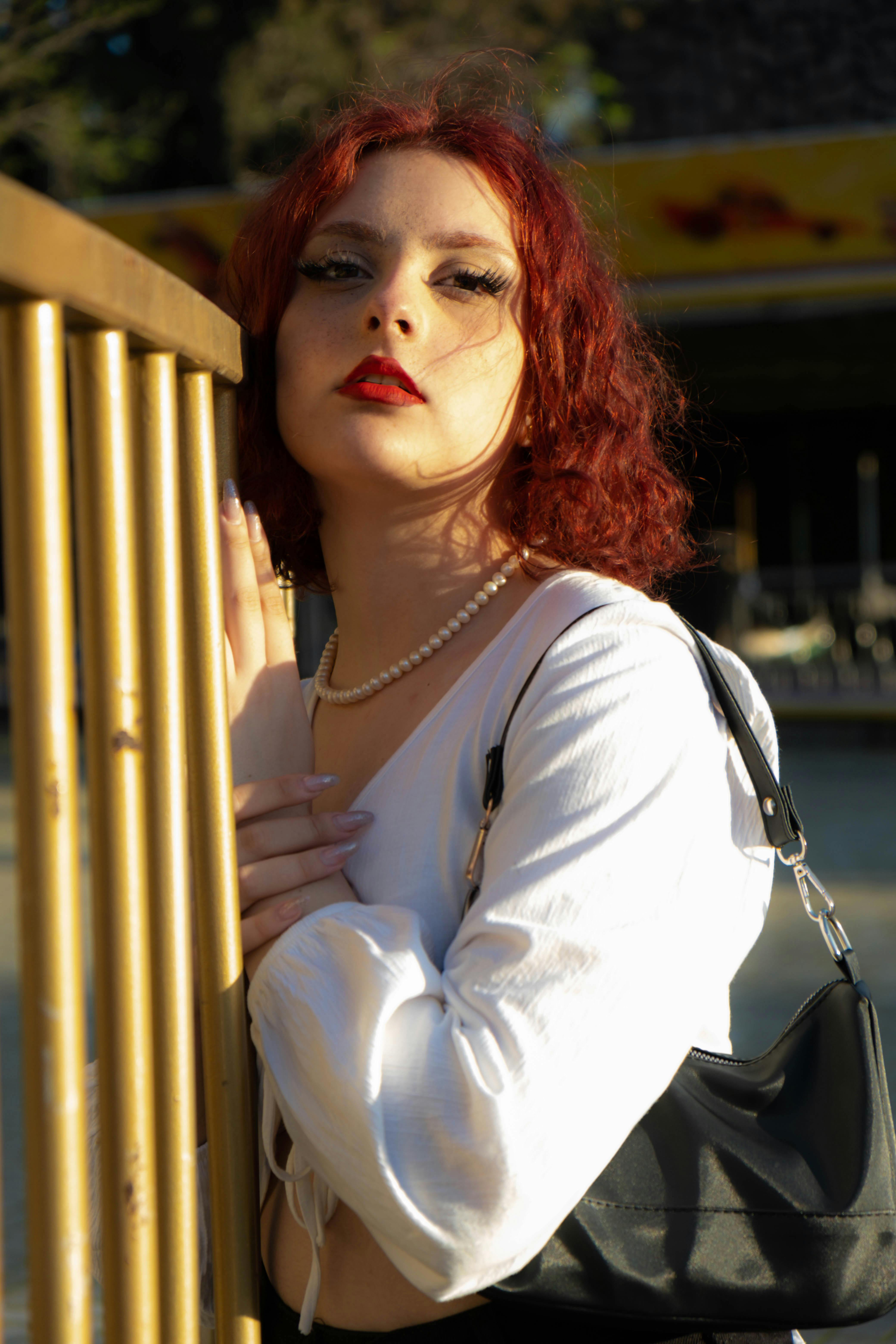 Photo of a Woman in Red Top · Free Stock Photo