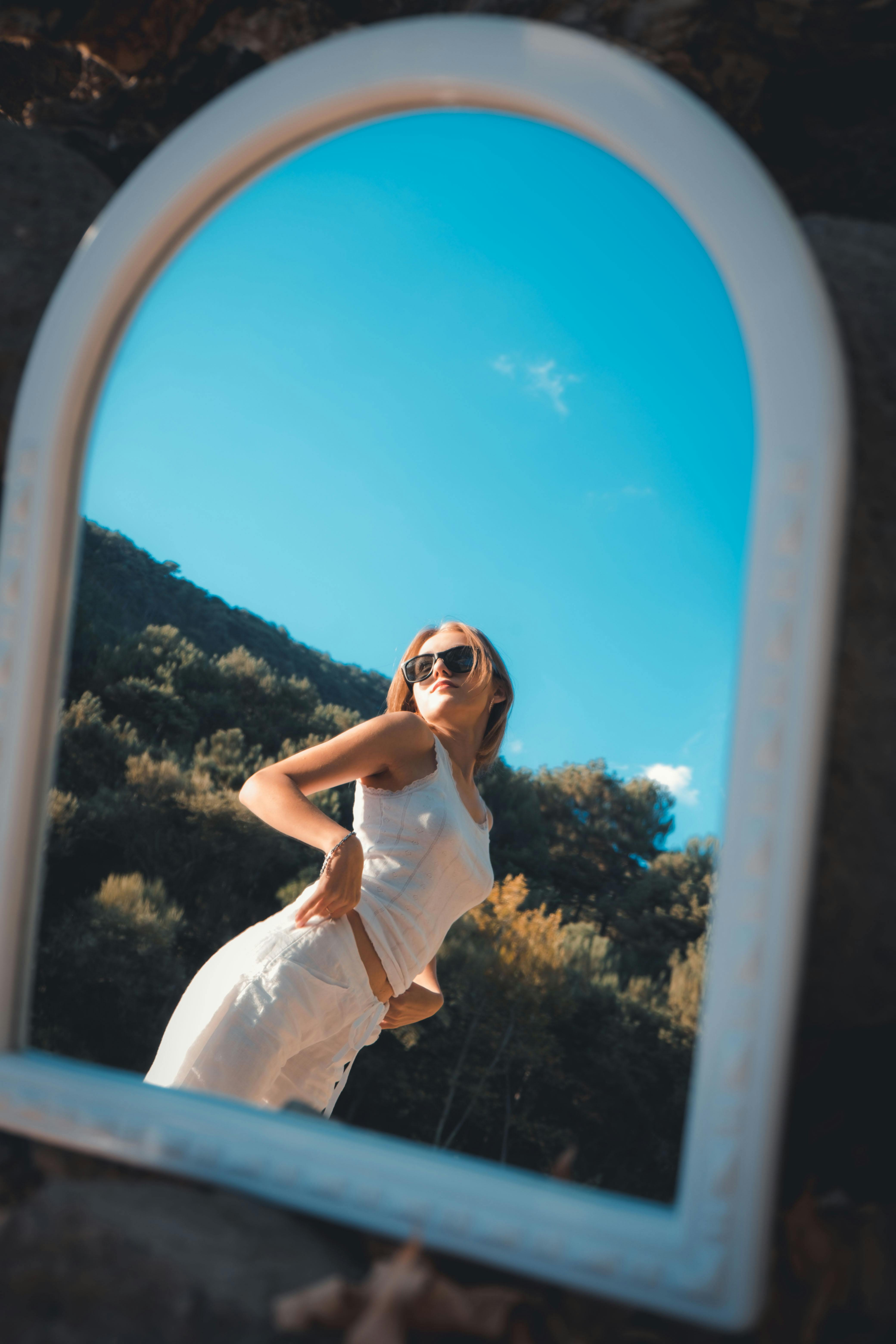 Mirror Reflection of a Beautiful Woman · Free Stock Photo