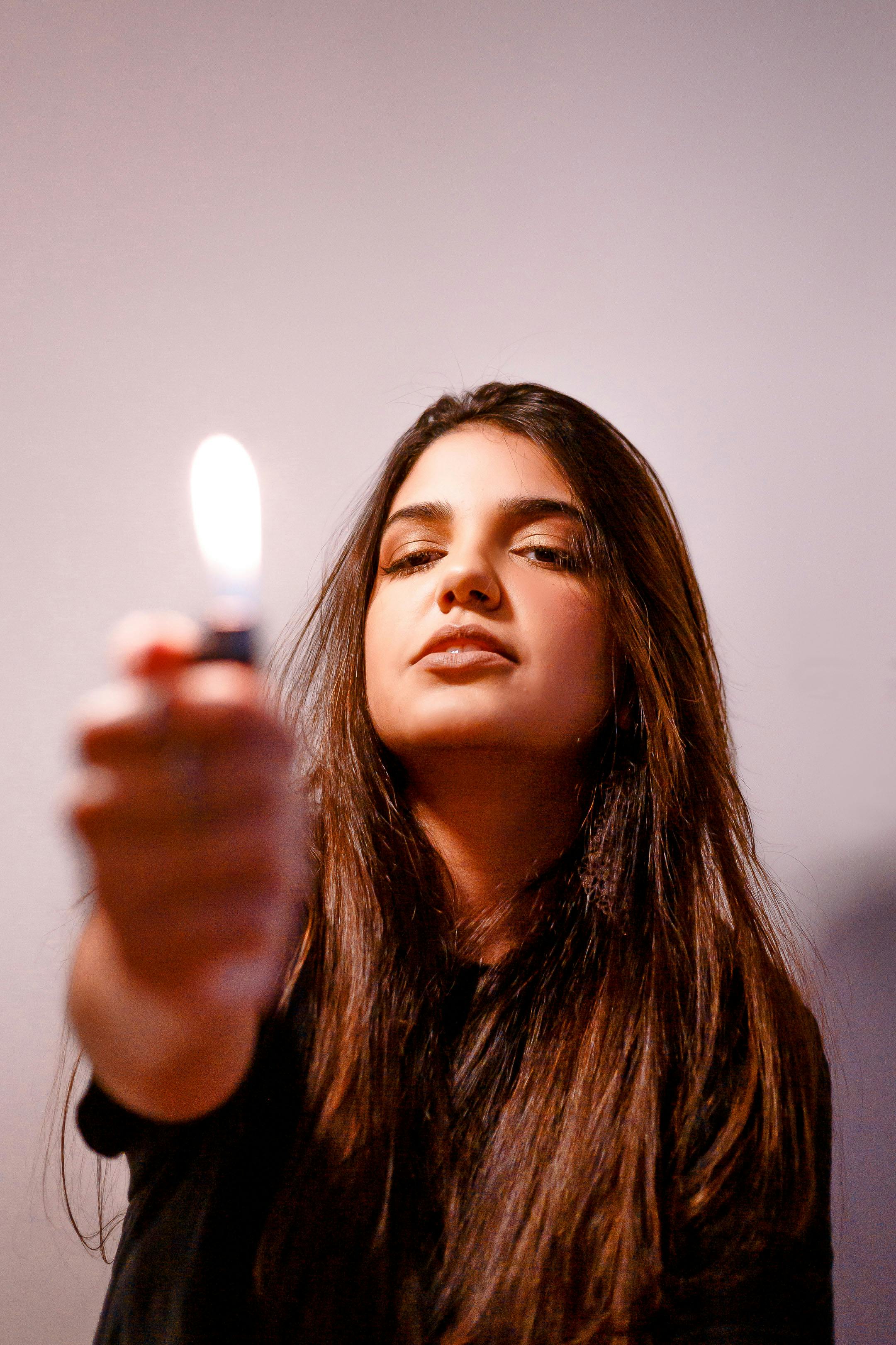 Woman with Lighter · Free Stock Photo