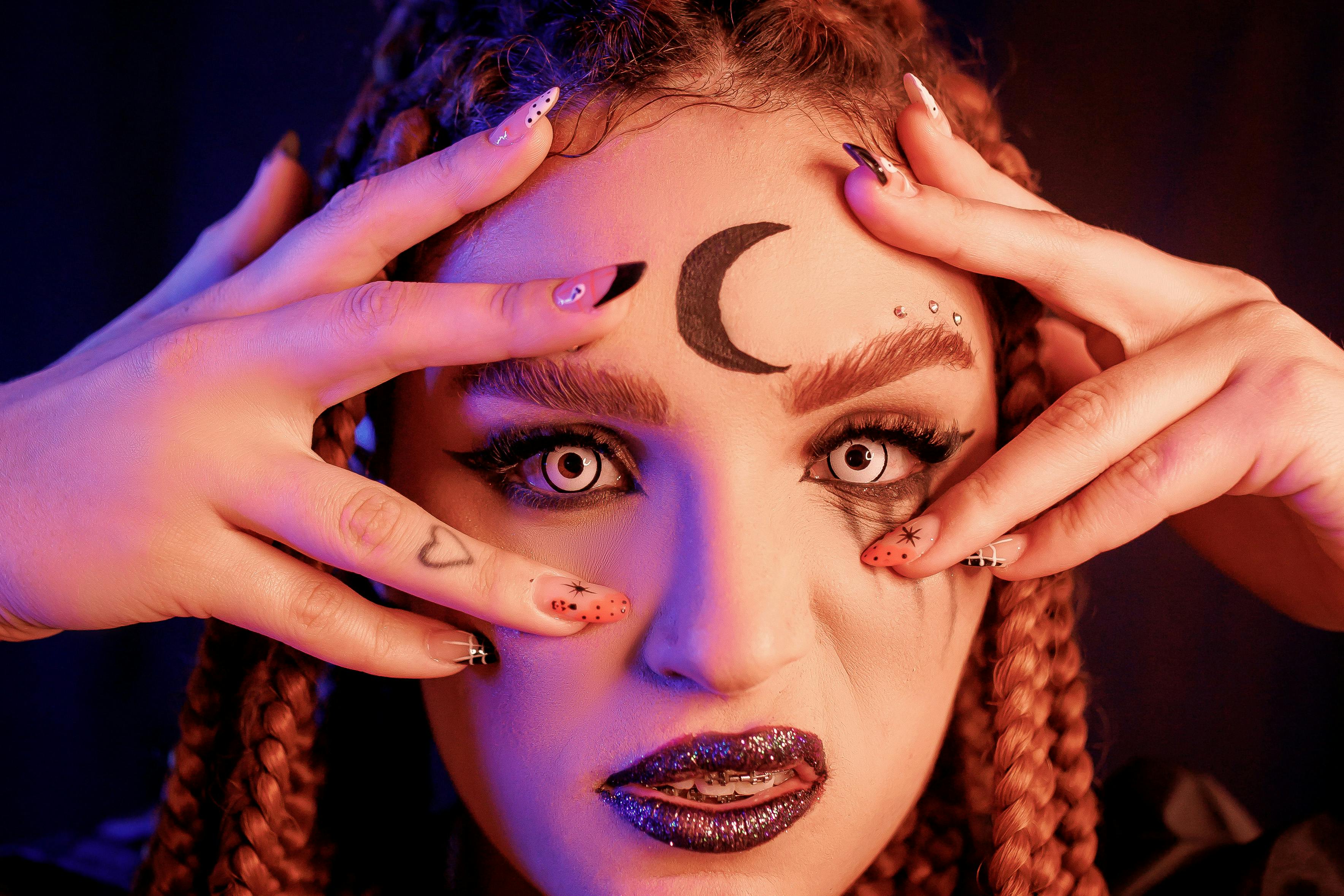 A Woman with a Moon Drawn on her Forehead · Free Stock Photo