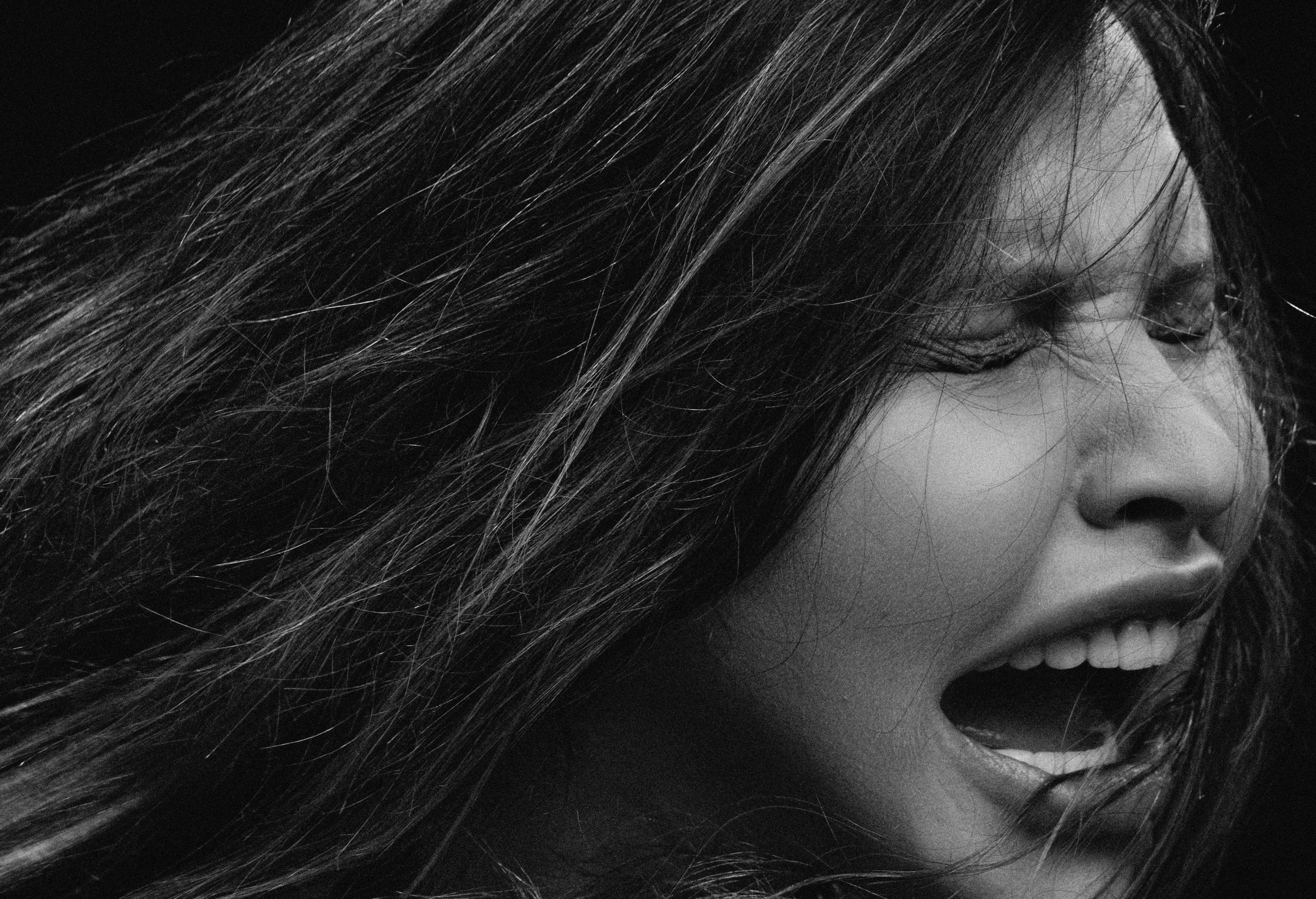 Close Photo of a Woman Screaming · Free Stock Photo