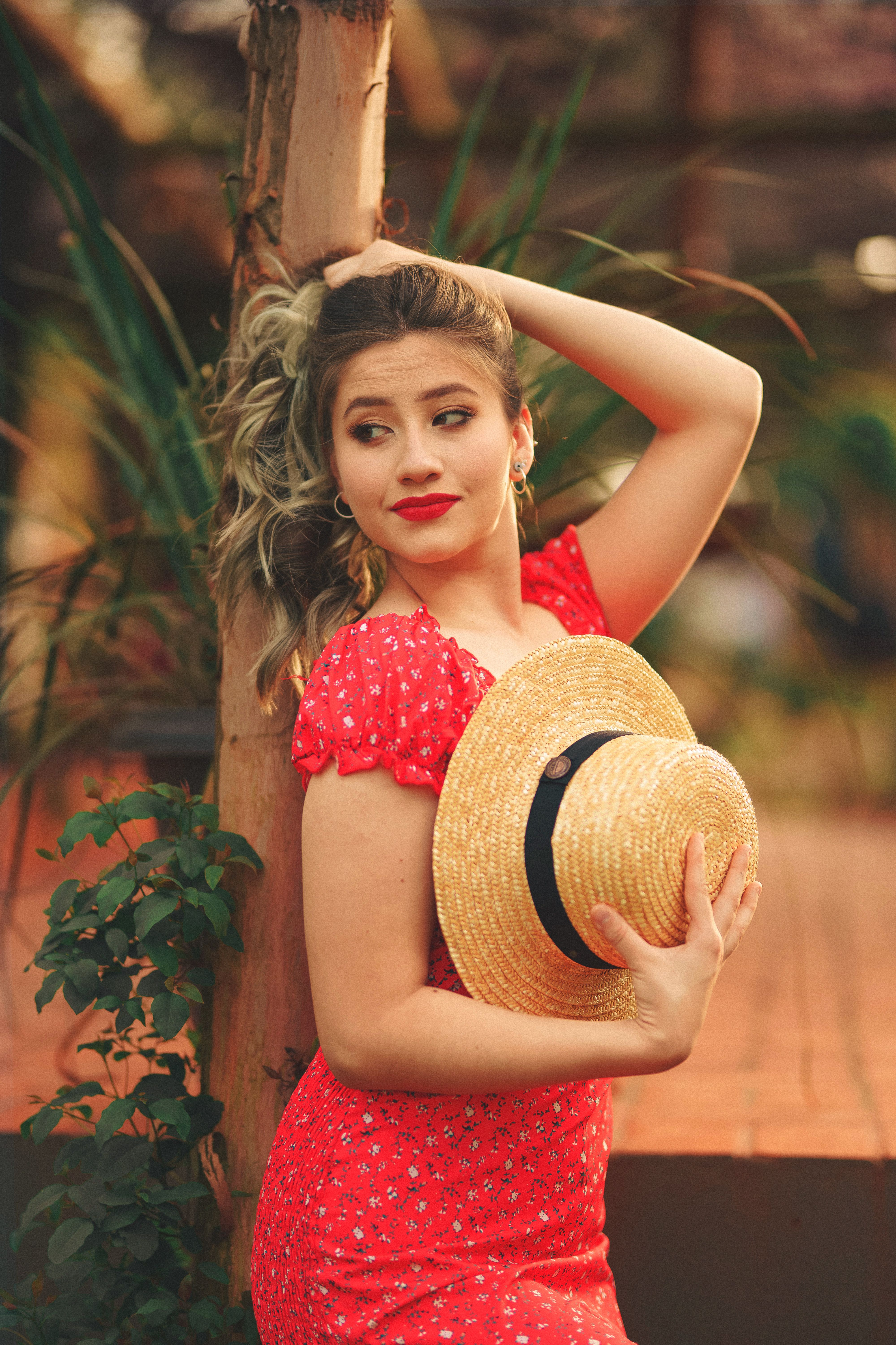 Woman Posing with Hat · Free Stock Photo