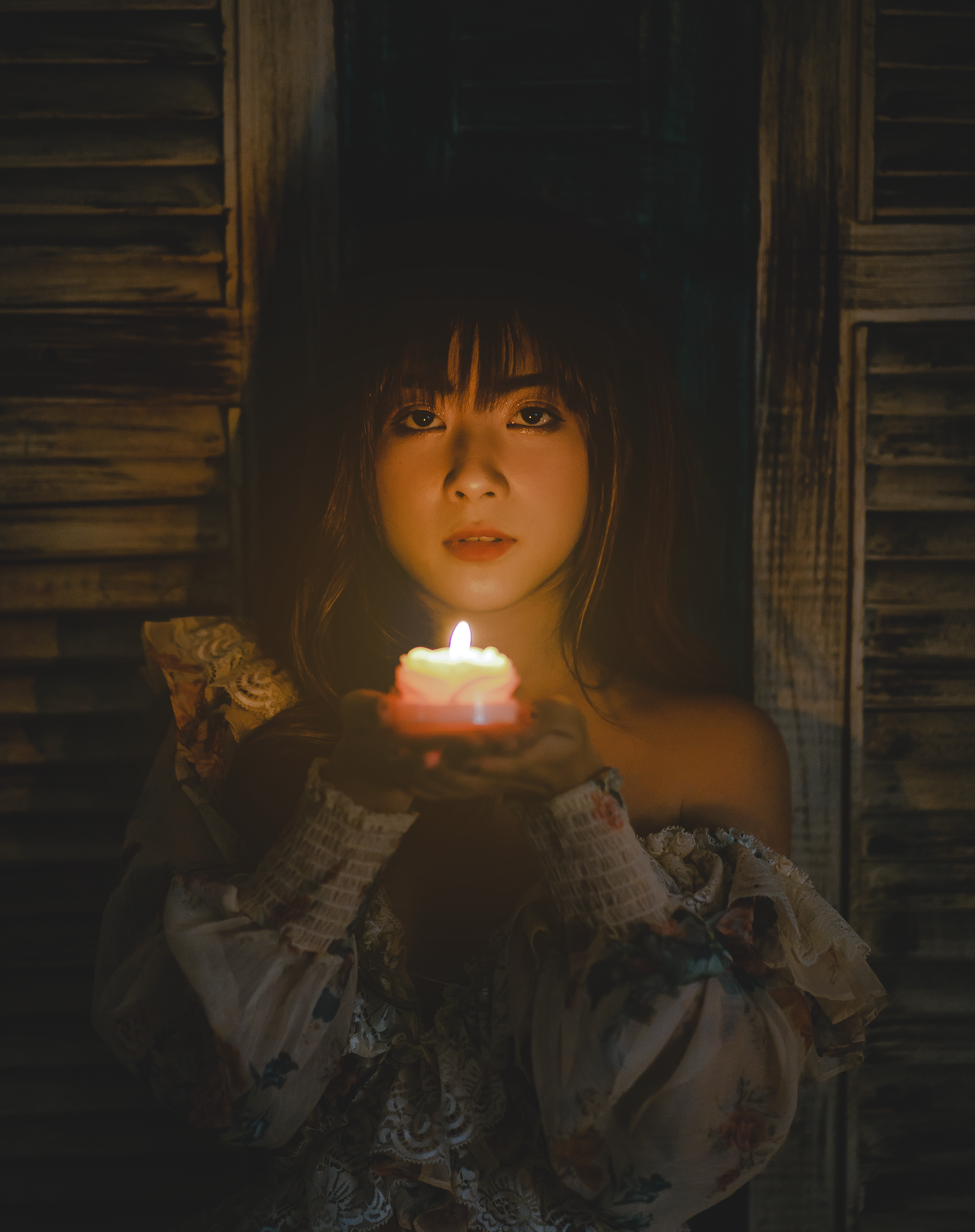 Woman Holding a Lighted Candle · Free Stock Photo