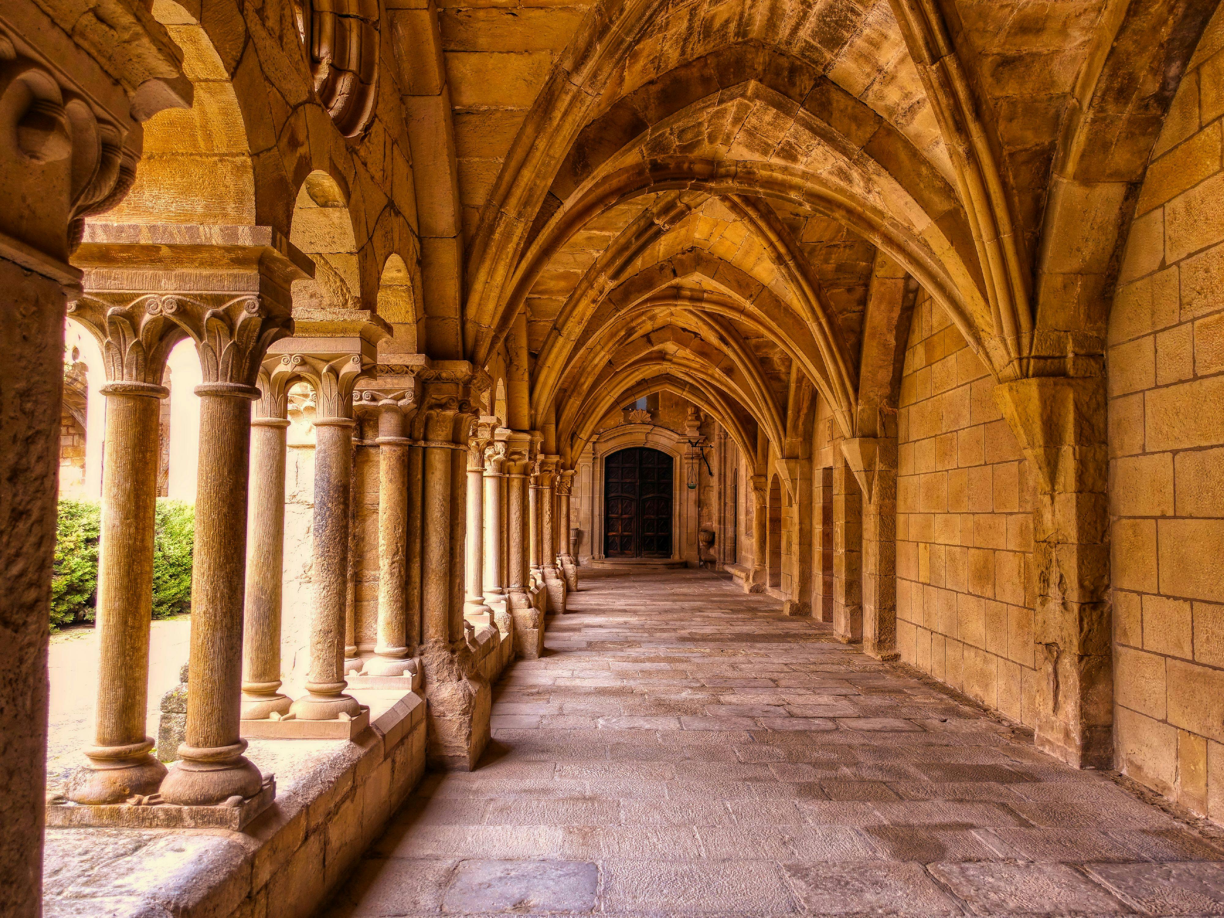 Arches of a Gothic Patio · Free Stock Photo