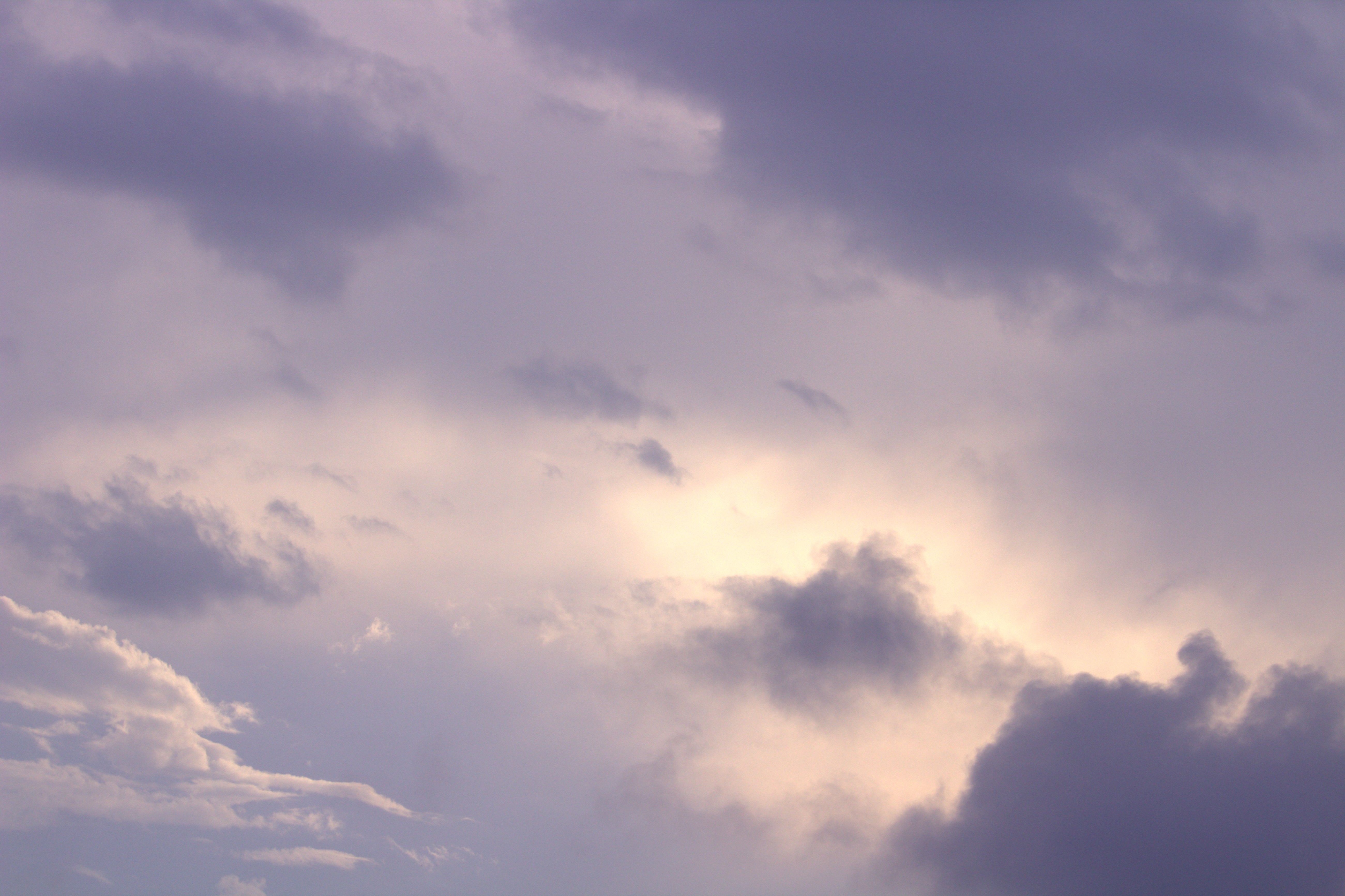 Cloudy Sky with Sun Breaking Through · Free Stock Photo