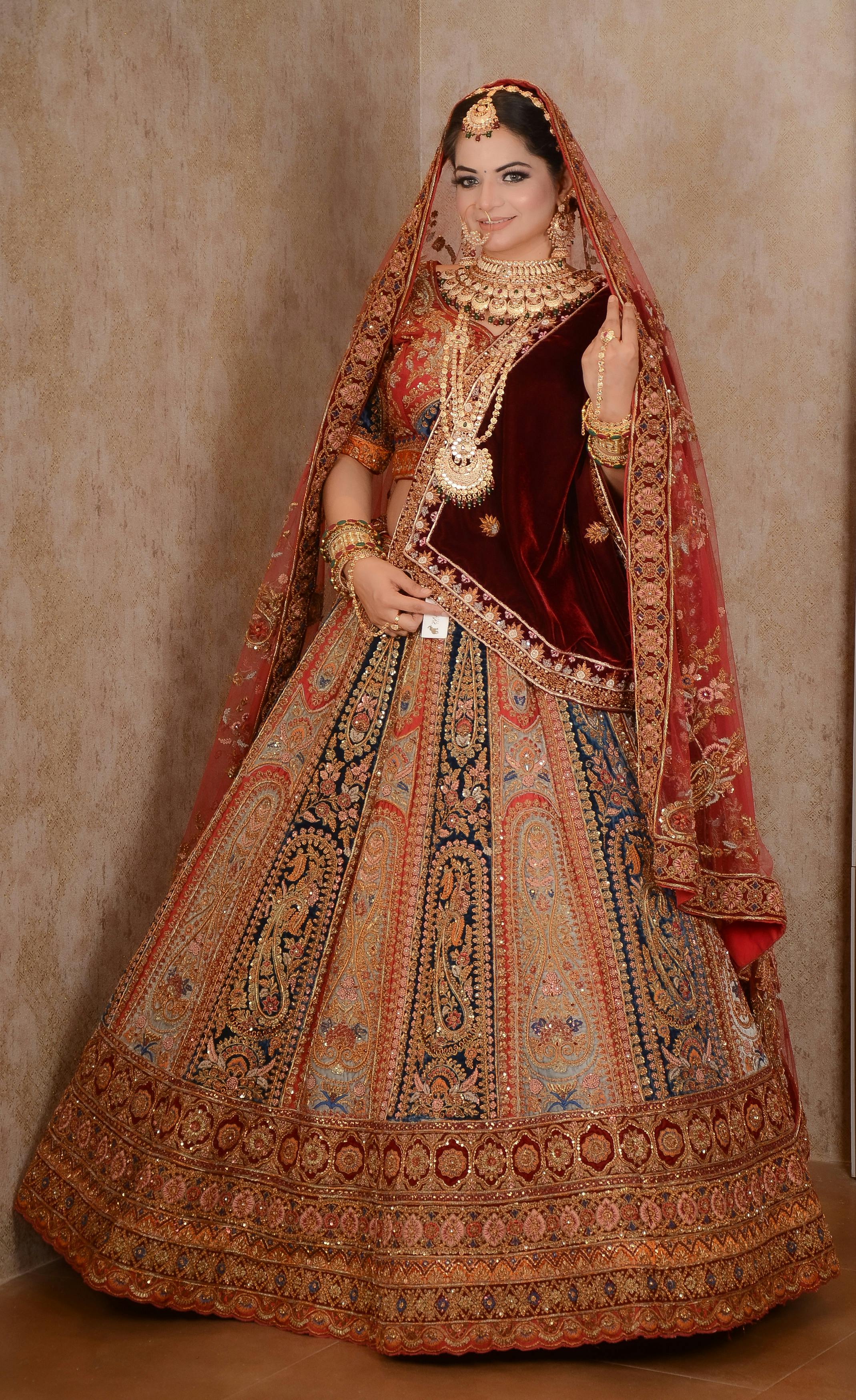 Woman Posing in Decorated, Traditional Dress · Free Stock Photo