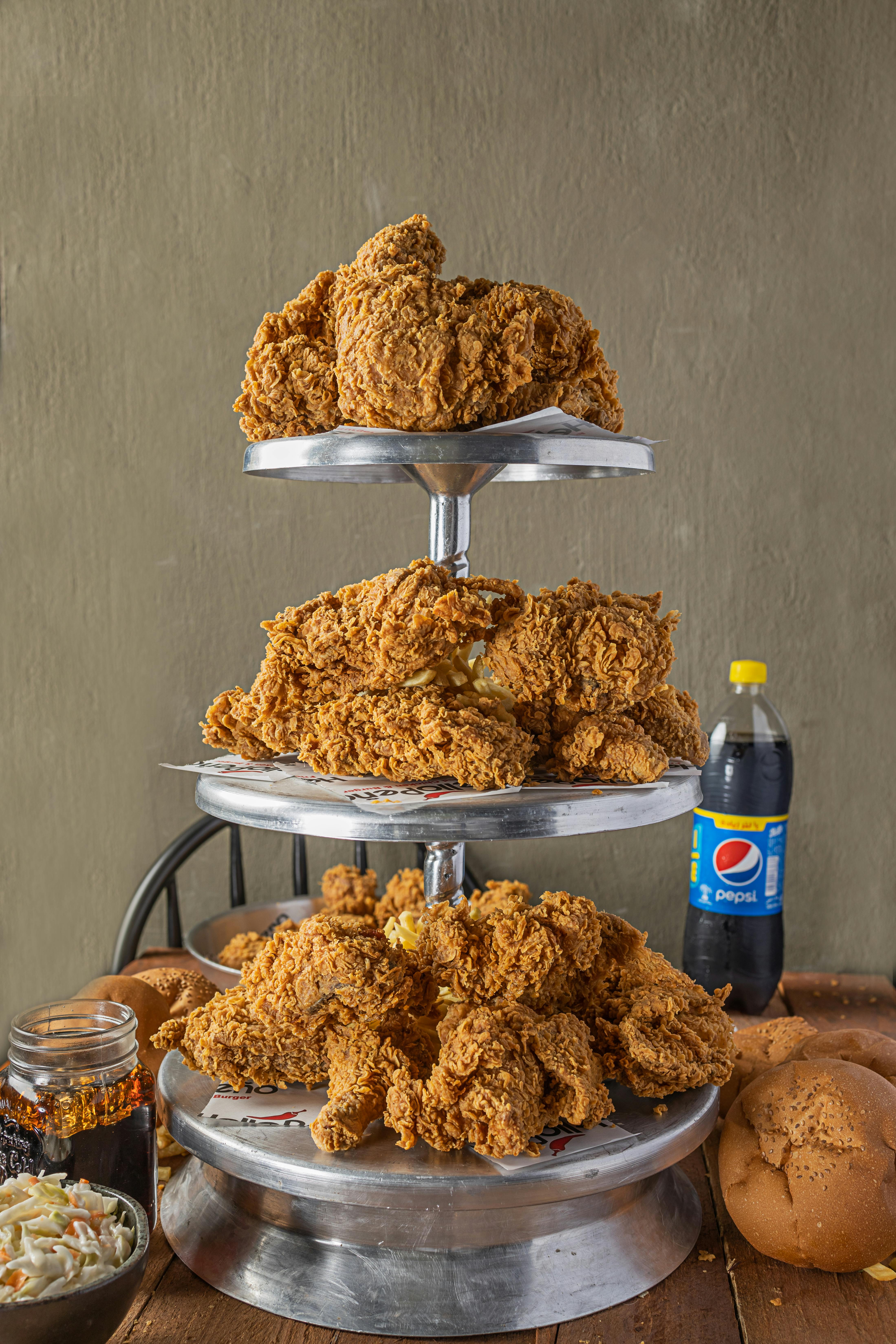 Close-Up Shot of Delicious Fried Chicken on White Ceramic Plate · Free ...