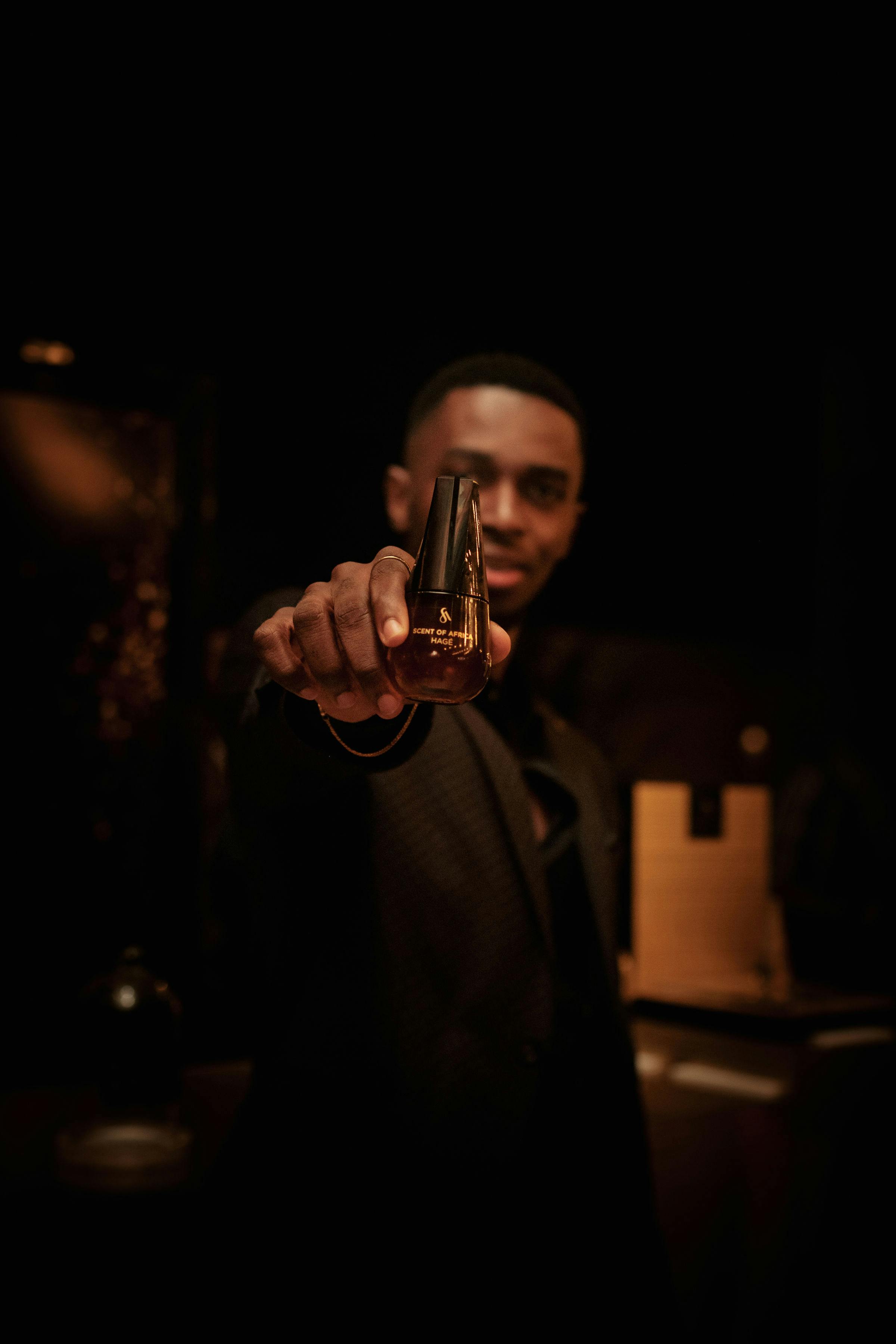 Man Showing Perfumes · Free Stock Photo