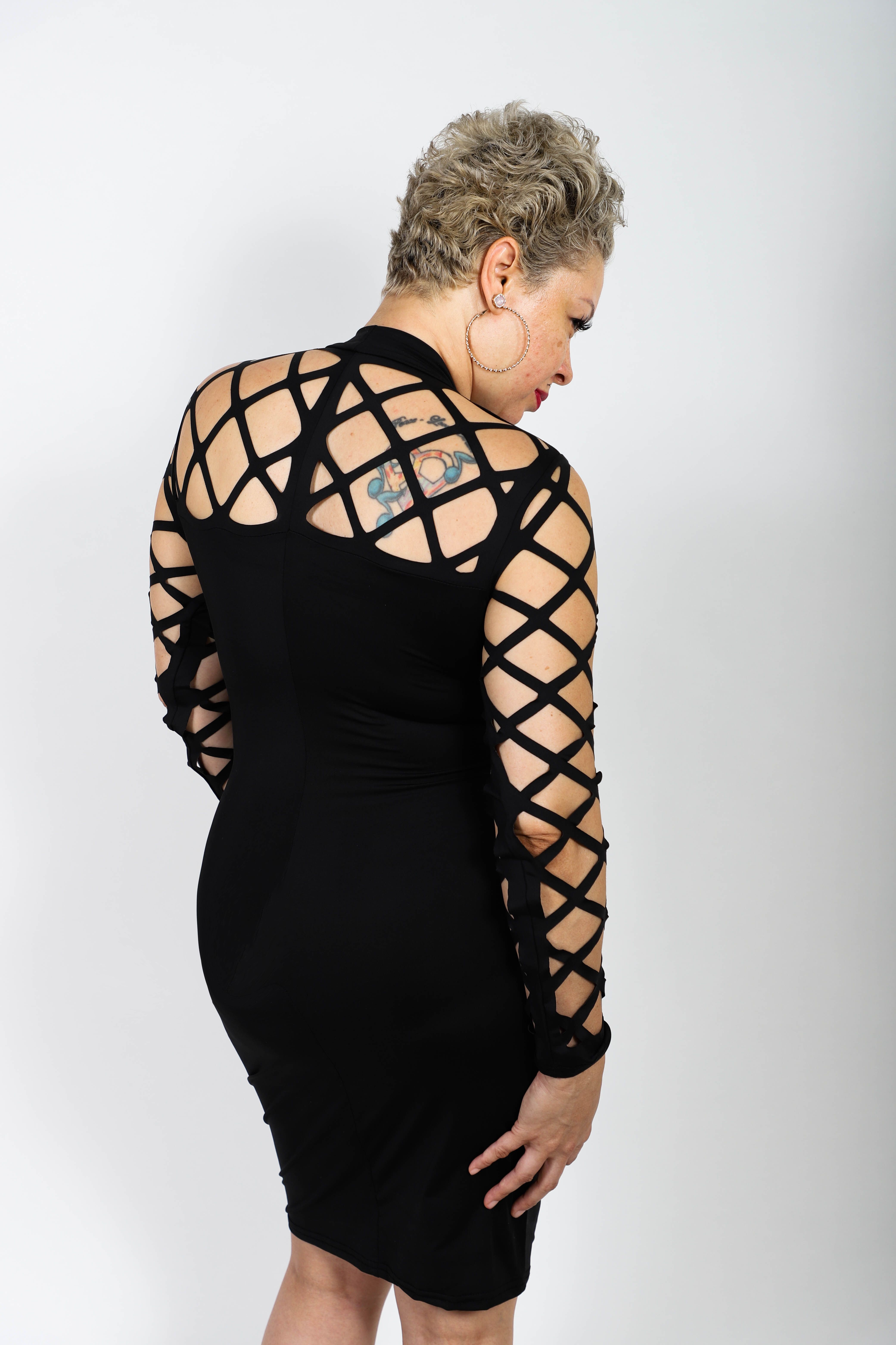 Back View of a Woman in a Dress · Free Stock Photo