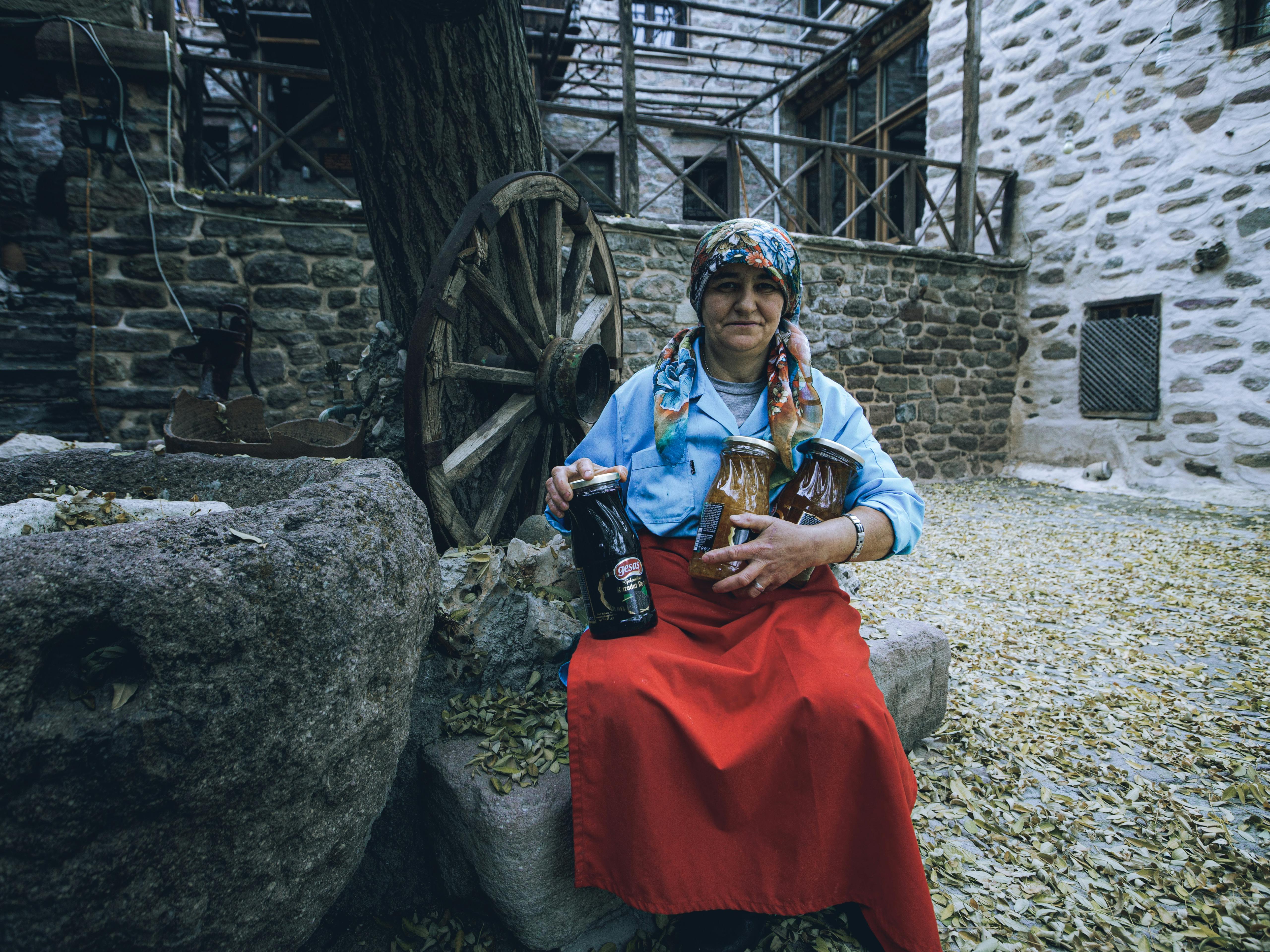 Woman in Traditional Clothes in Ancient Building · Free Stock Photo