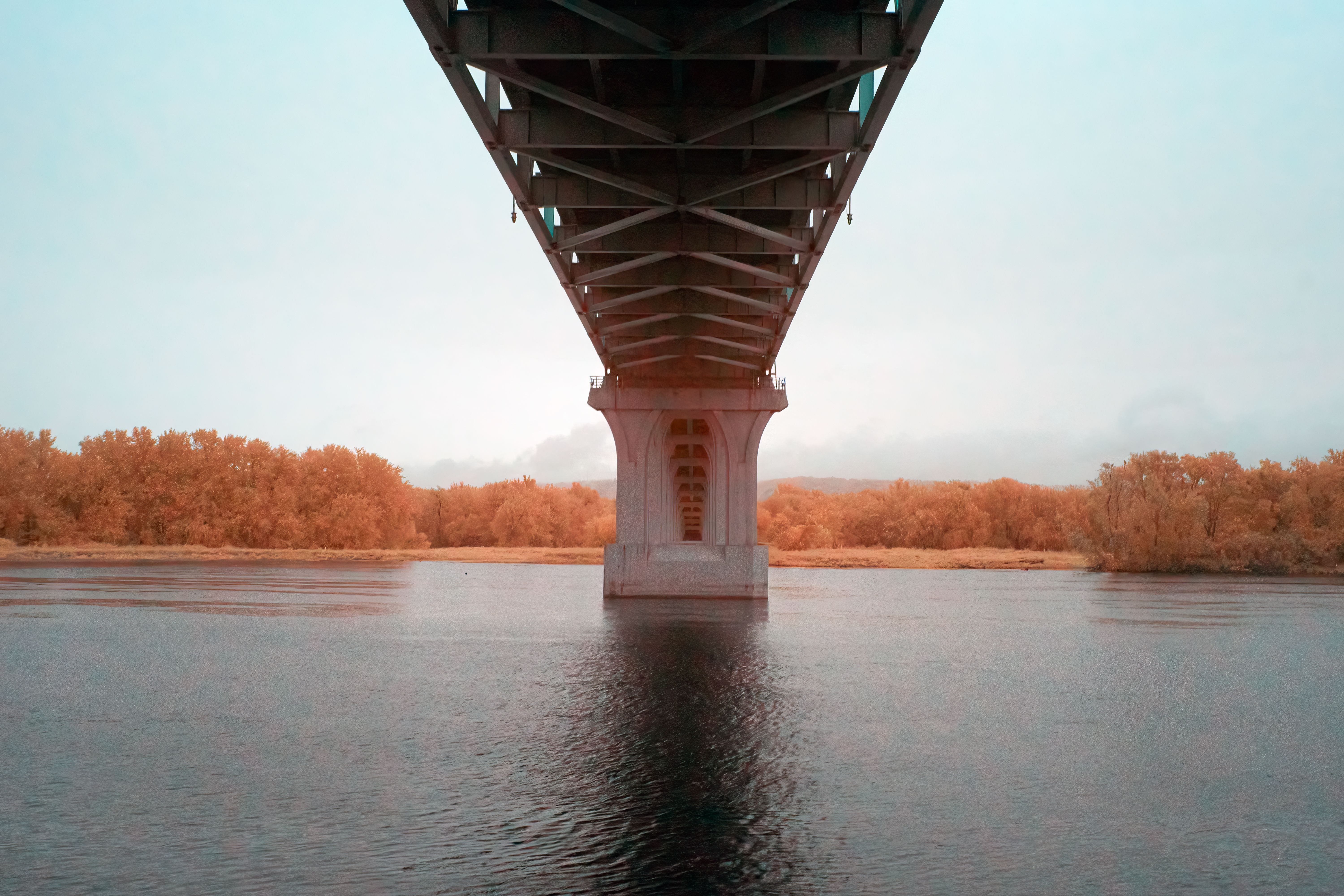 Bridge over a Murky River · Free Stock Photo